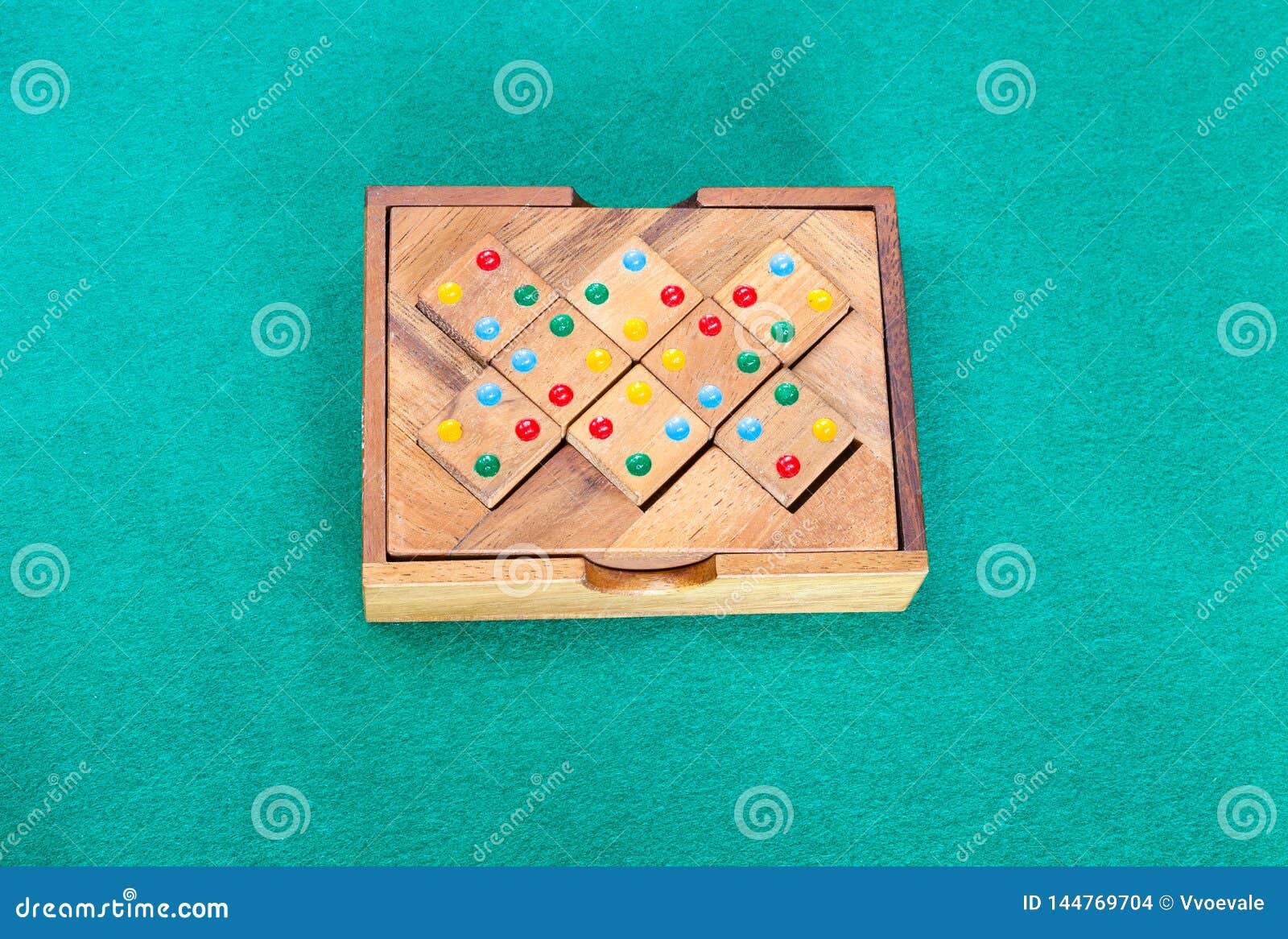 Wooden Box with Puzzle on Green Table Stock Photo - Image of game ...