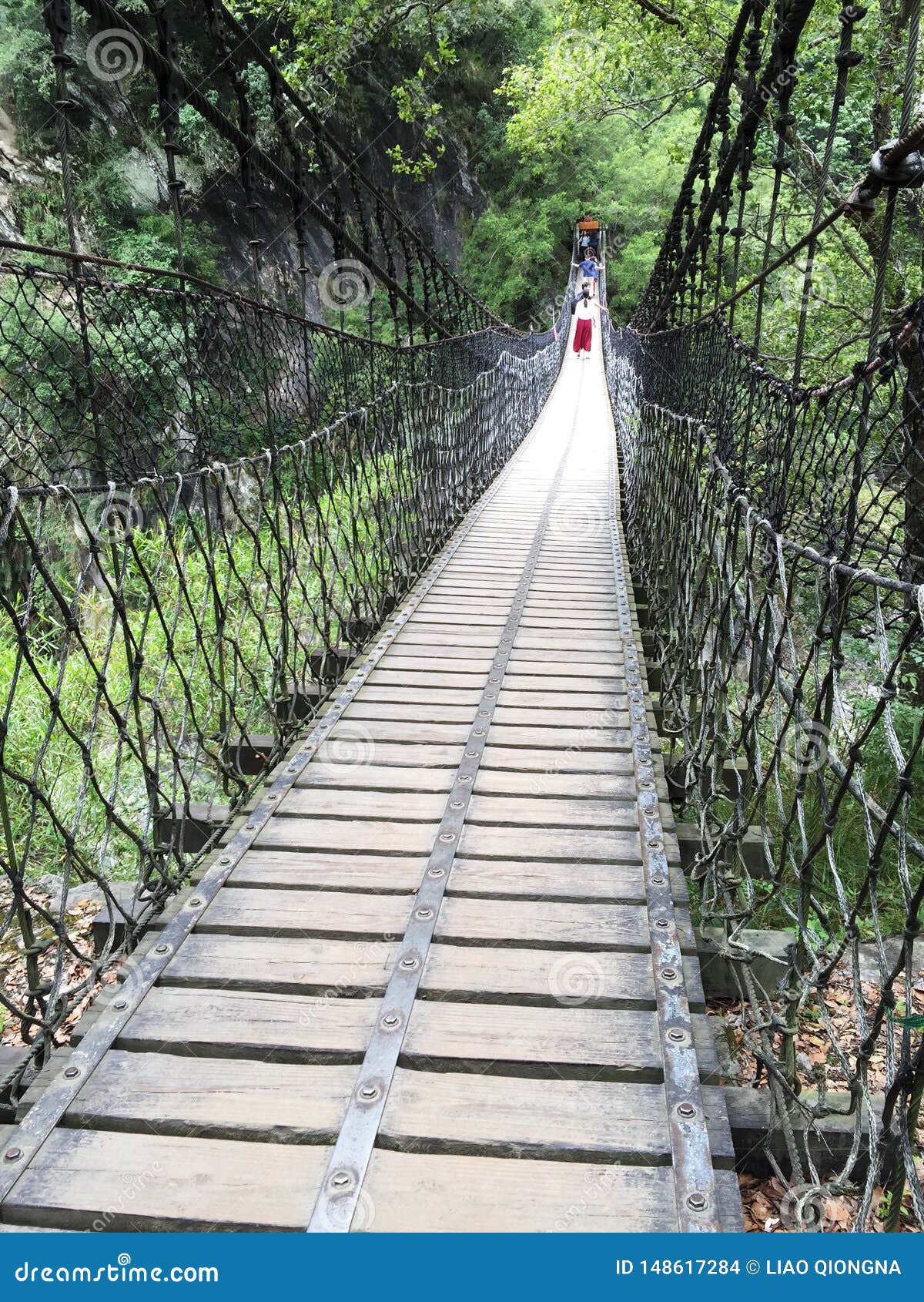 Wooden Bridge Built between the Mountains, People Crossing the Path ...