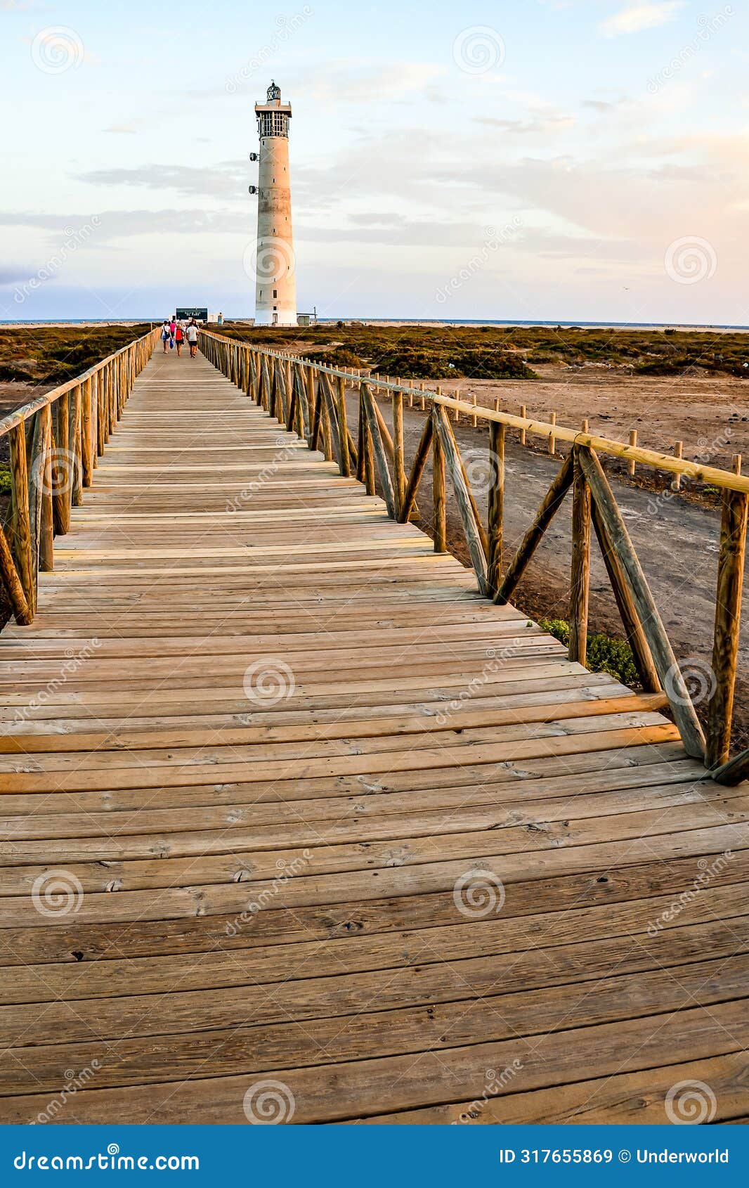 A Wooden Bridge Leads To a Lighthouse Stock Image - Image of road, path ...