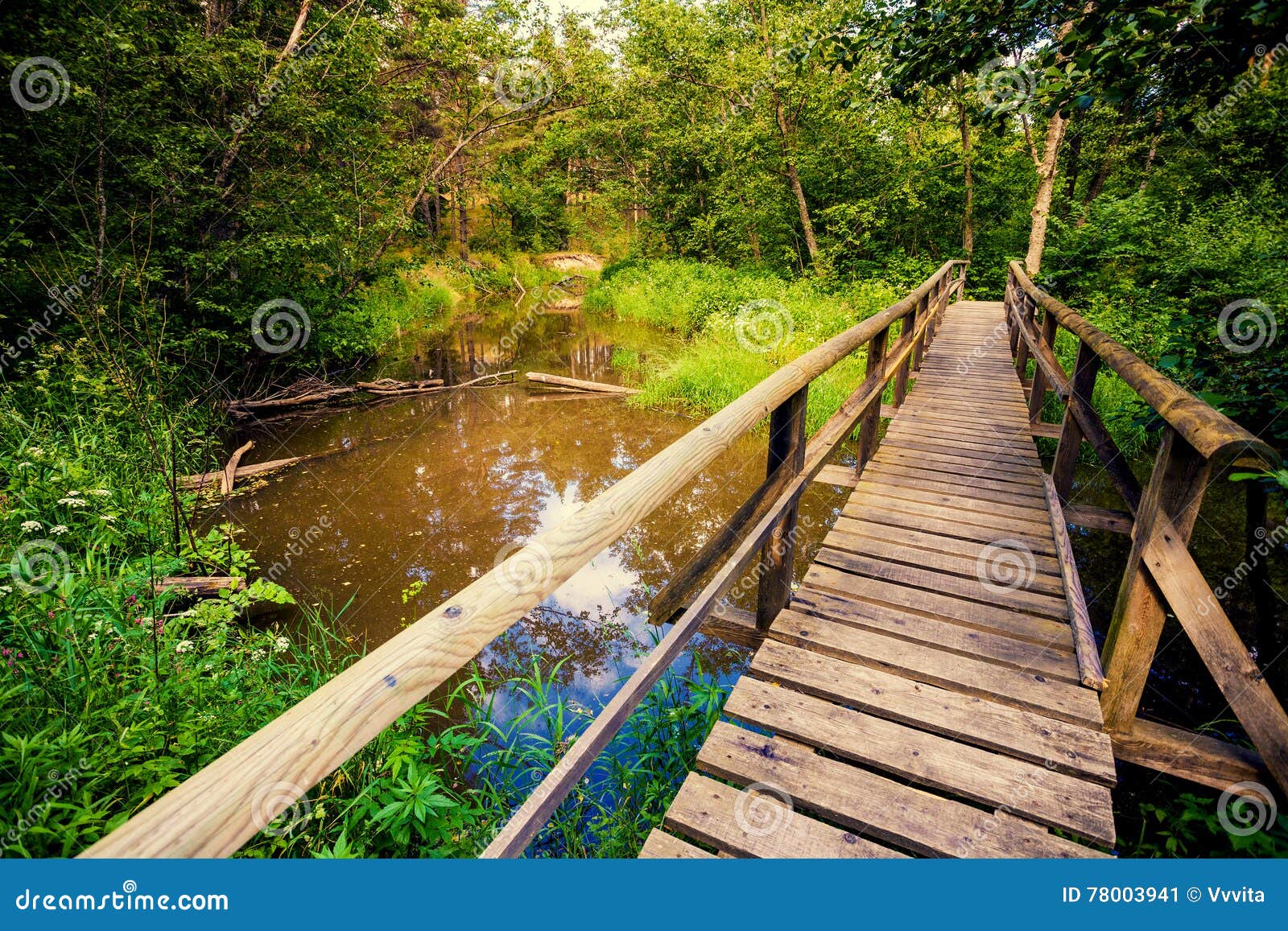 Wooden bridge over brook stock image. Image of bridge - 78003941