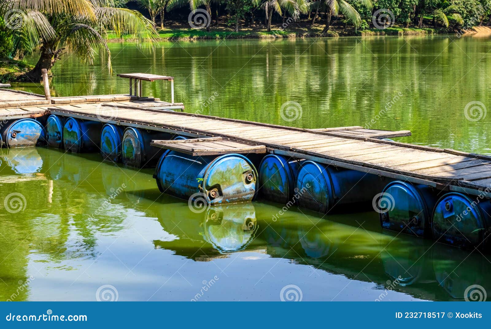 A Wooden Bridge Over the Canal Made with Recycle Plastic Drum Stock ...