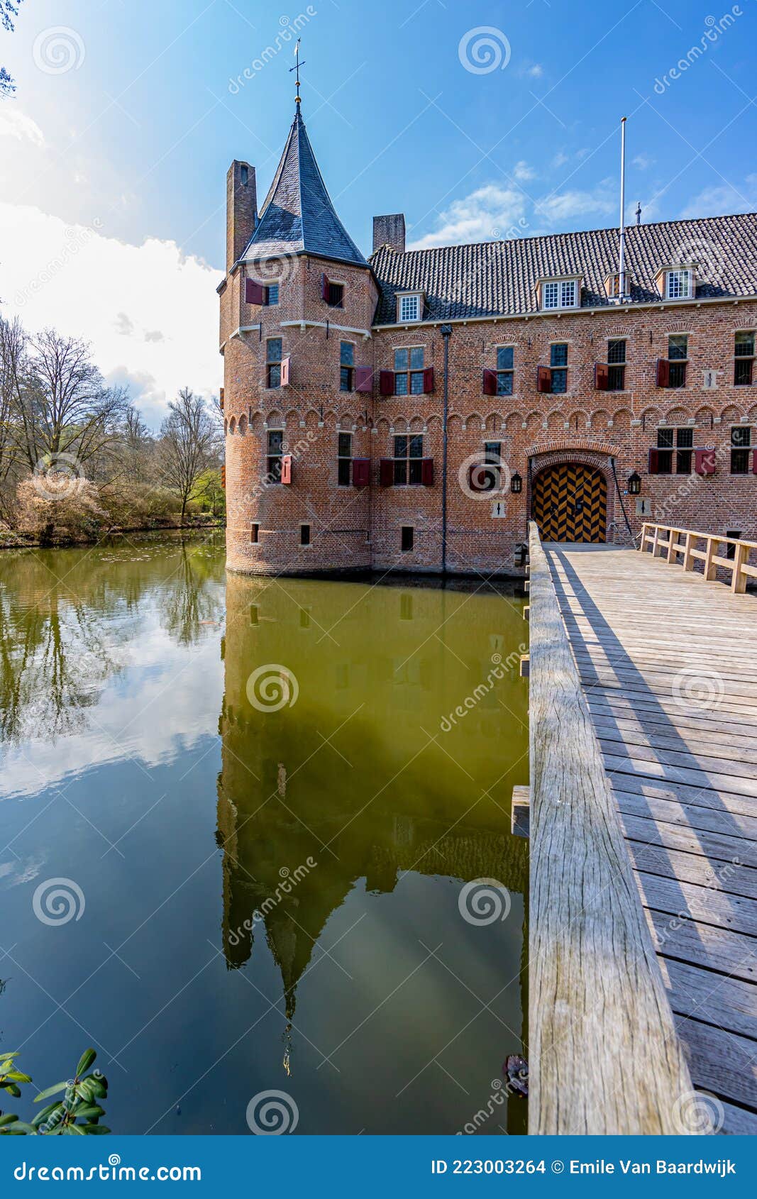Wooden Bridge Over the Moat with Het Oude Loo Castle Tower Reflected on ...