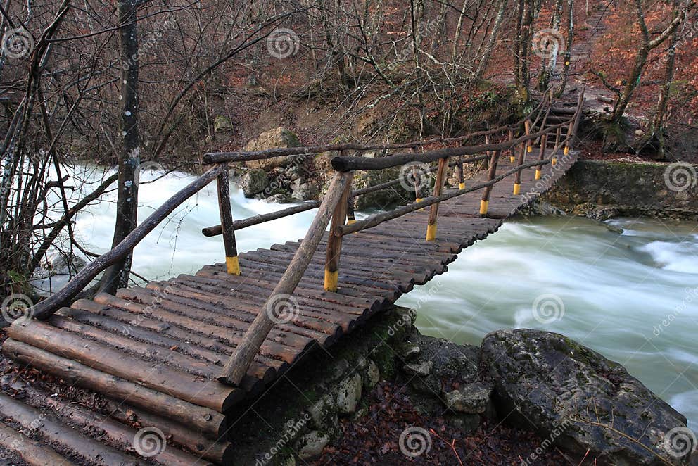 Wooden Bridge Over Mountain River Stock Photo - Image of safety, brown ...