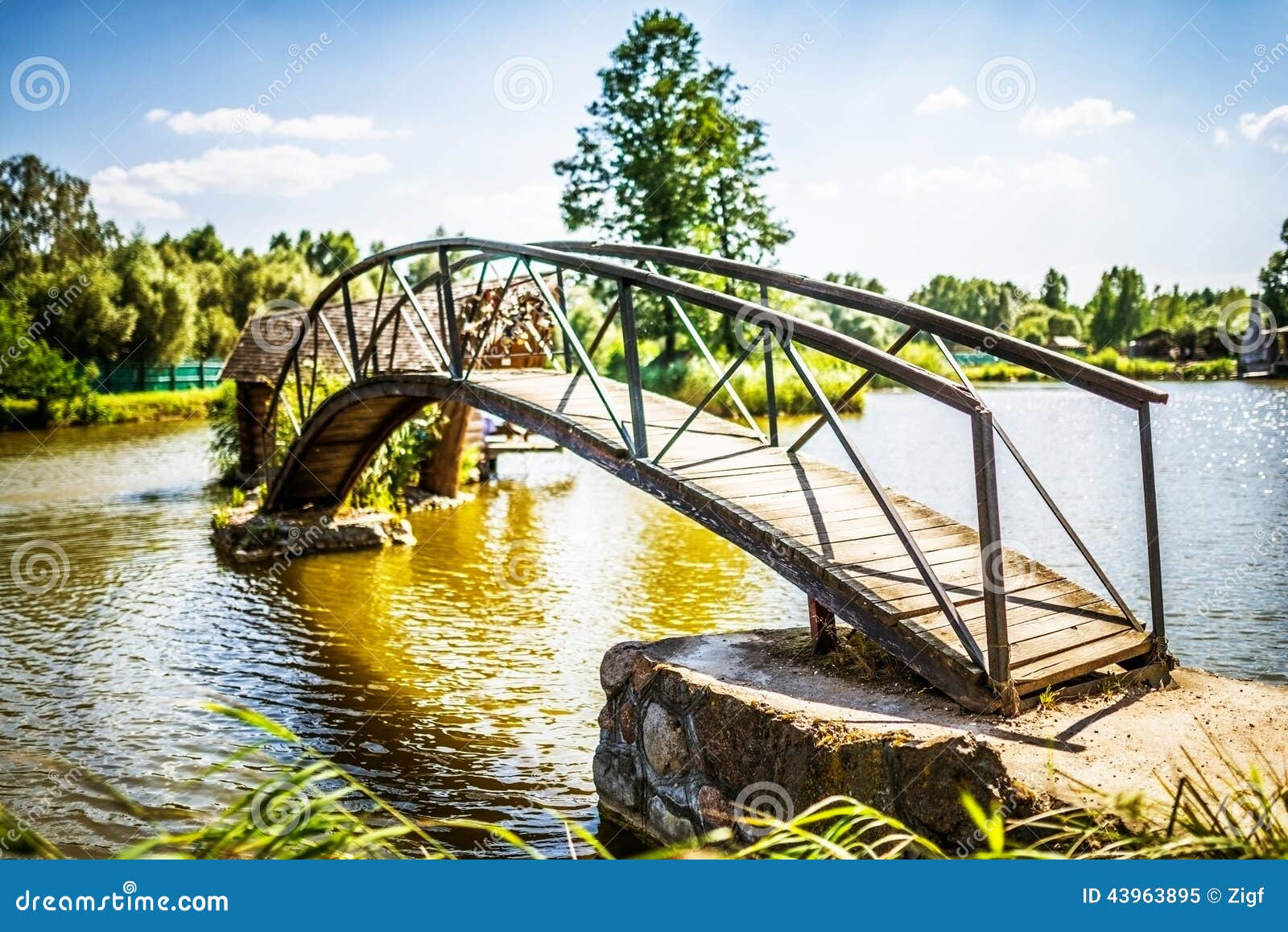 Wooden bridge over river stock image. Image of garden - 43963895