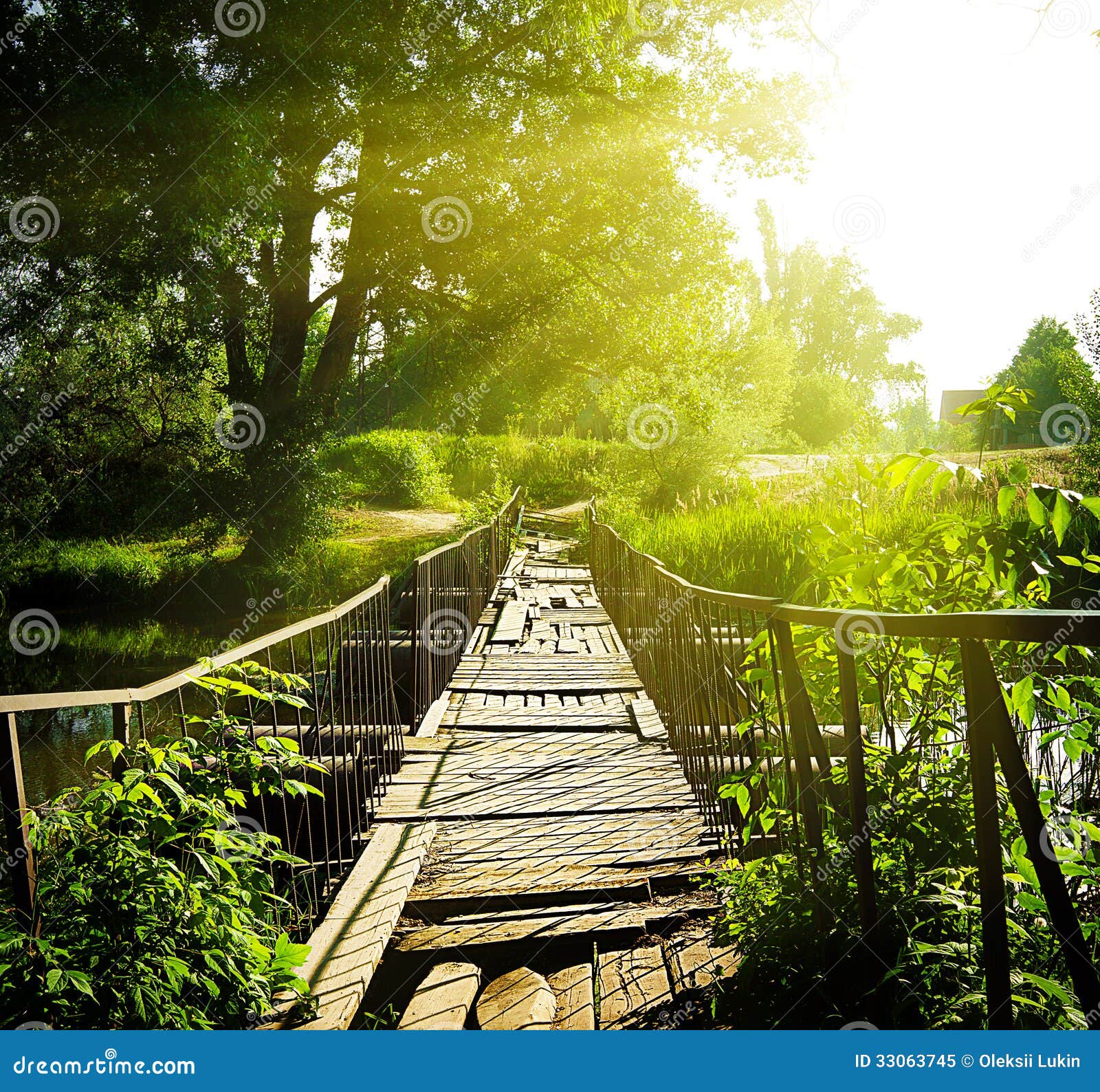 Wooden Bridge Over the River Stock Image - Image of waterfall, river ...