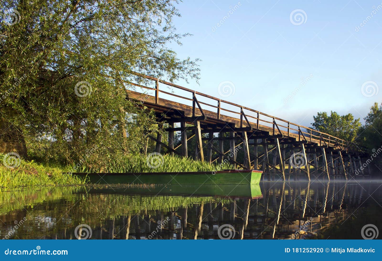 Wooden Bridge Over the River Stock Photo - Image of wooden, river ...
