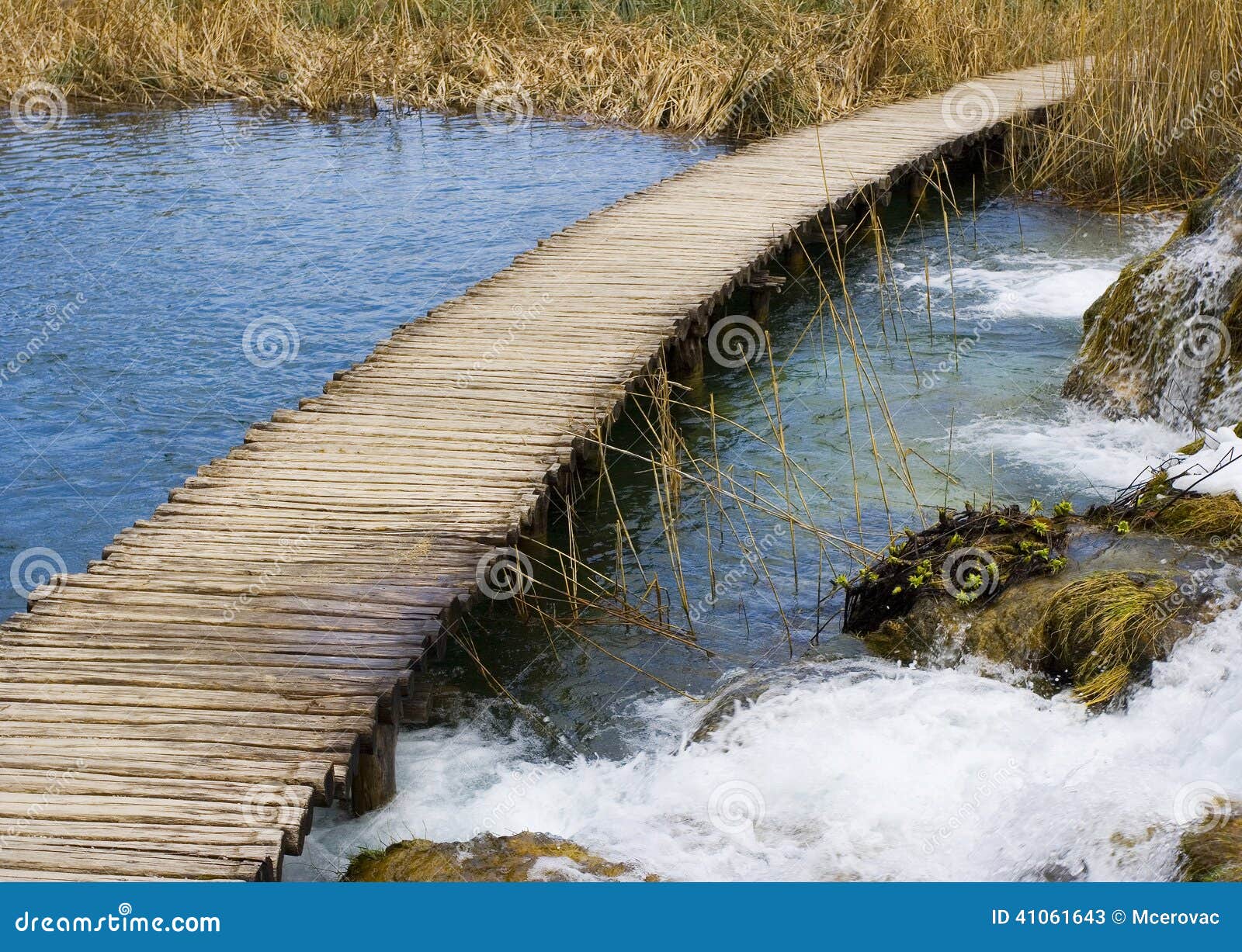 Wooden bridge over a river stock image. Image of curving - 41061643