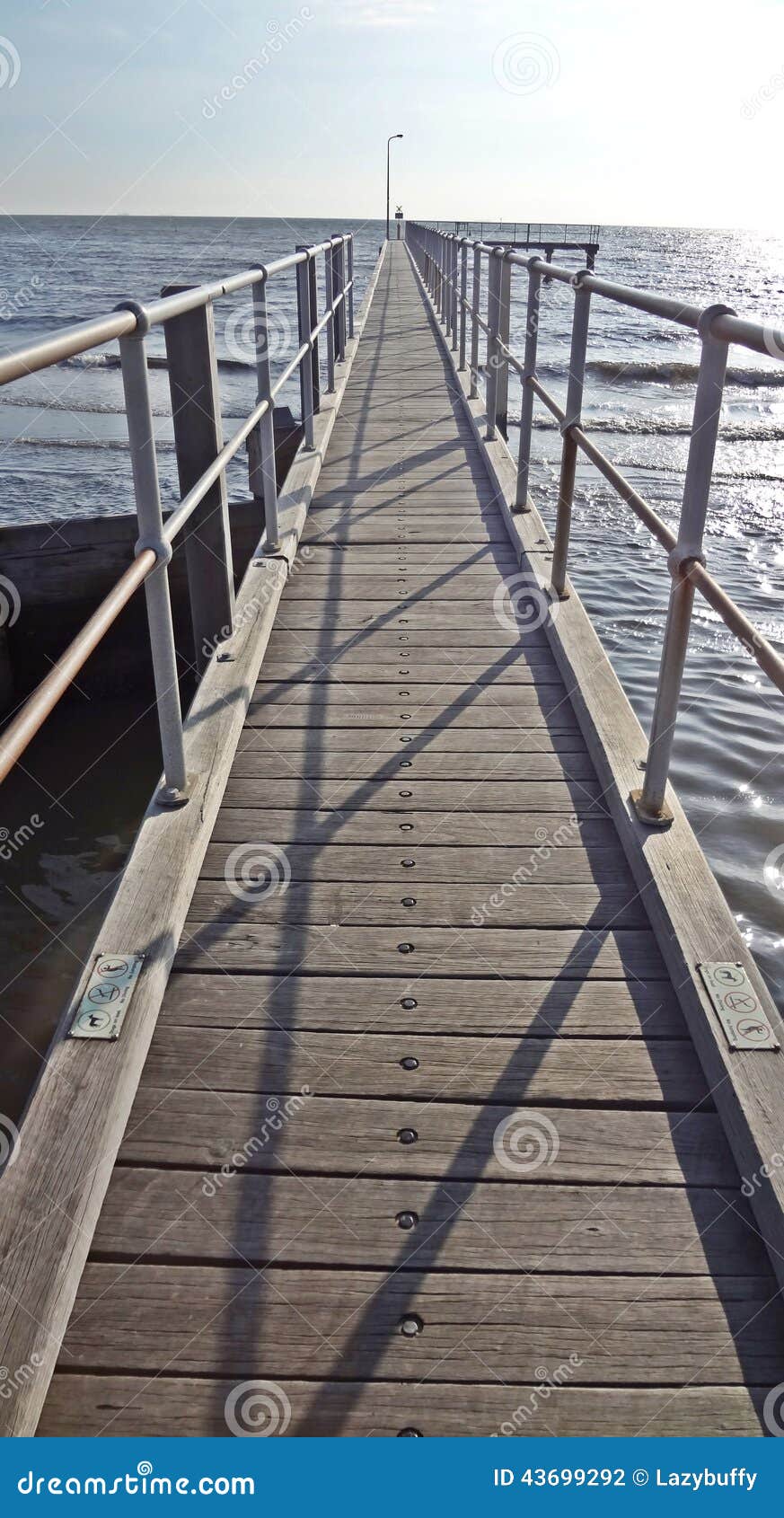 Wooden bridge over the sea stock photo. Image of romantic - 43699292