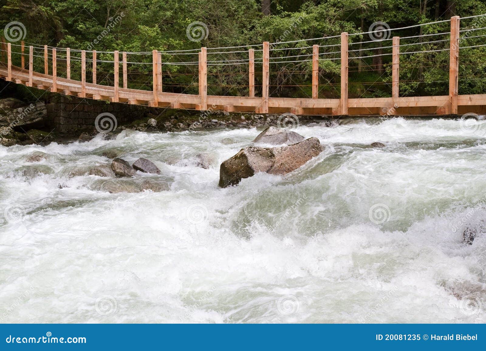 Wooden Bridge Over Wild Waters Stock Image - Image of stones, italian ...