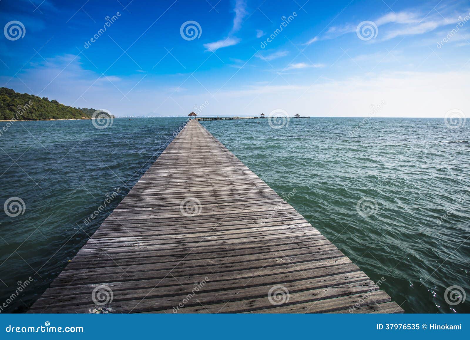 Wooden bridge to the sea. stock image. Image of footbridge - 37976535