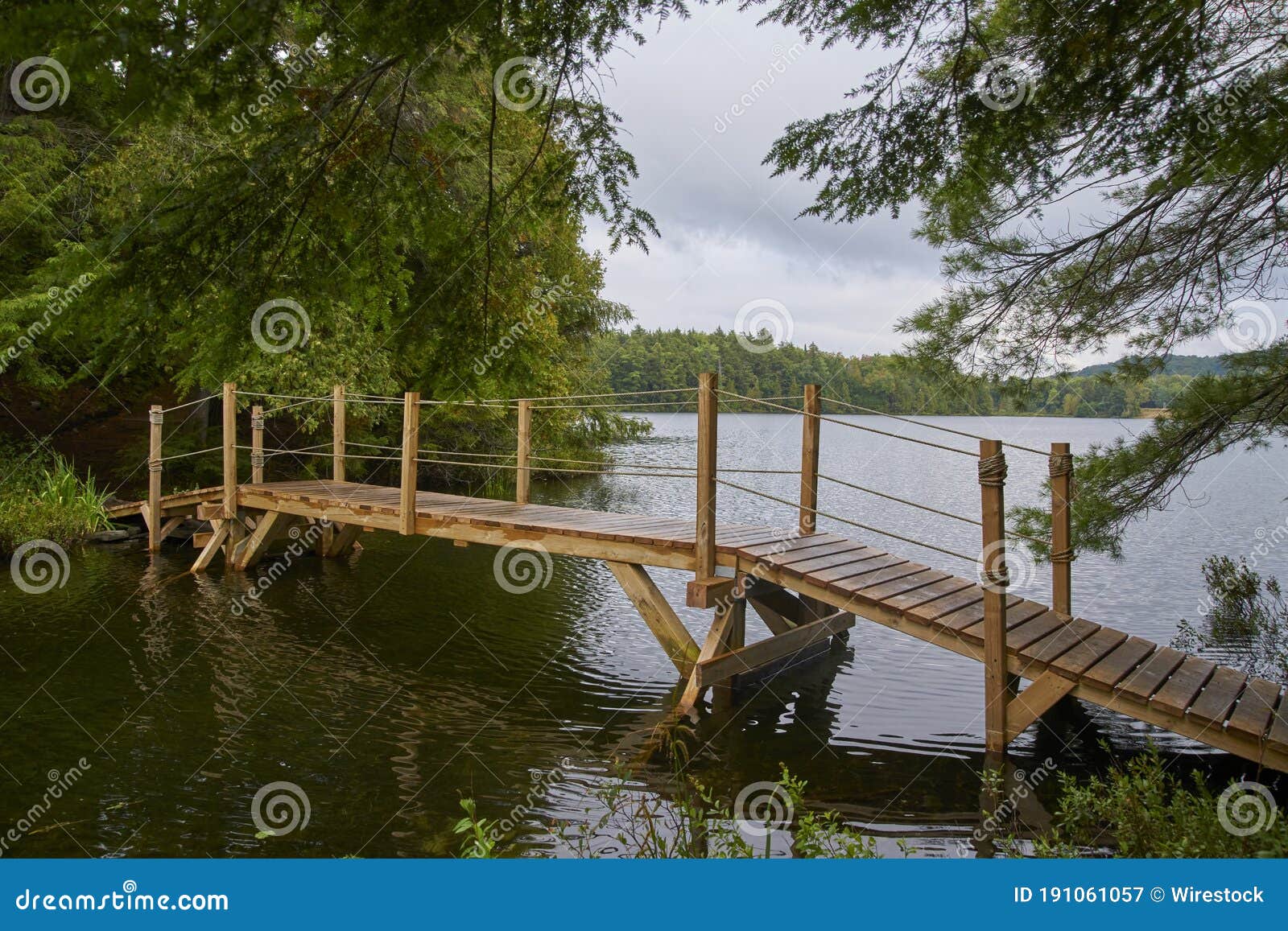 Wooden Bridge on the Water Surrounded by Trees in Canada Stock Image ...