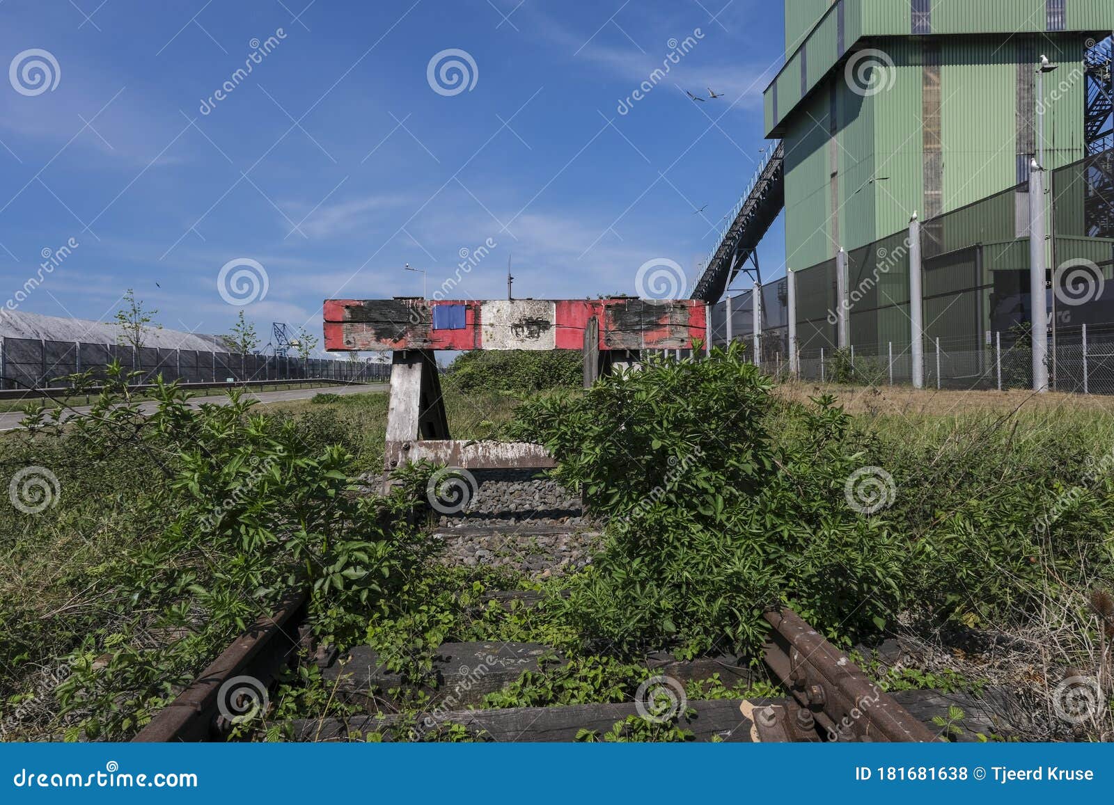 Wooden Buffer Stop with Red Stop Sign Ending Rail Tracks Concept for ...