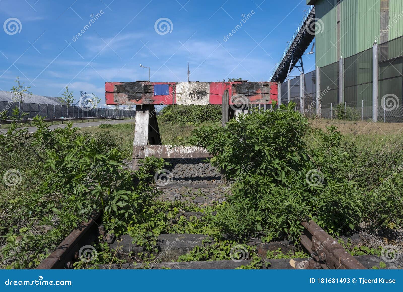 Wooden Buffer Stop with Red Stop Sign Ending Rail Tracks Concept for ...