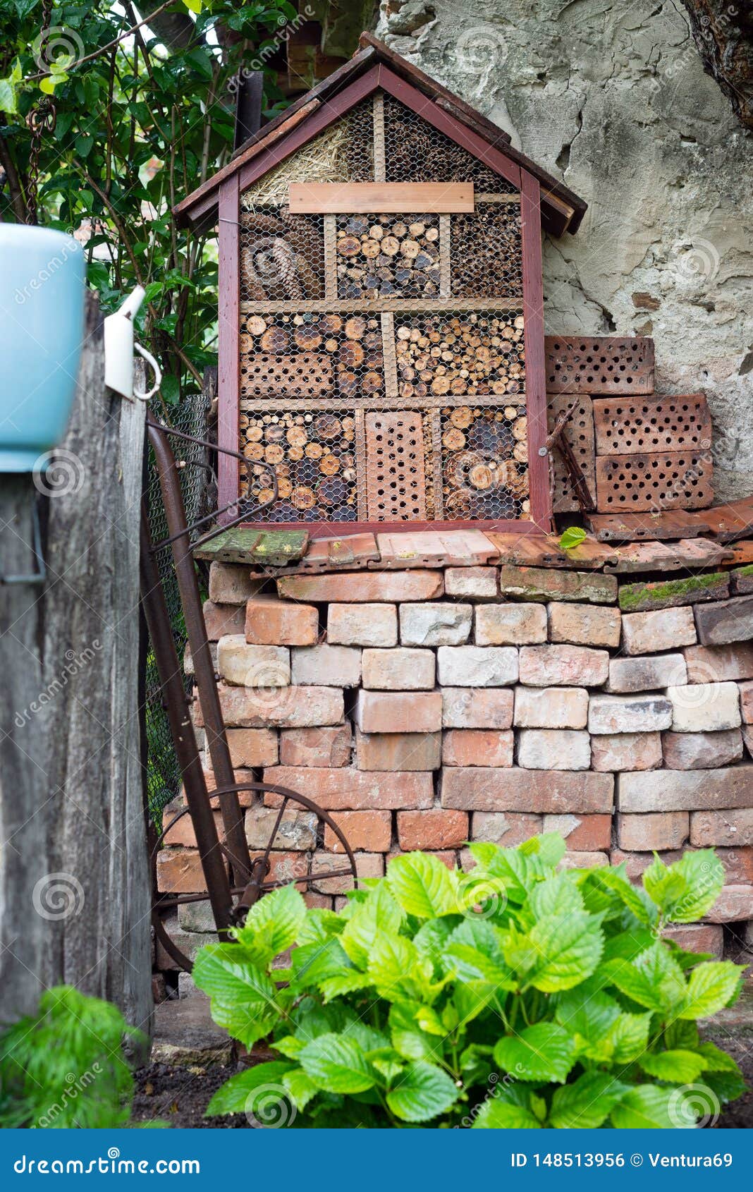 Wooden bug house in garden stock photo. Image of insect - 148513956