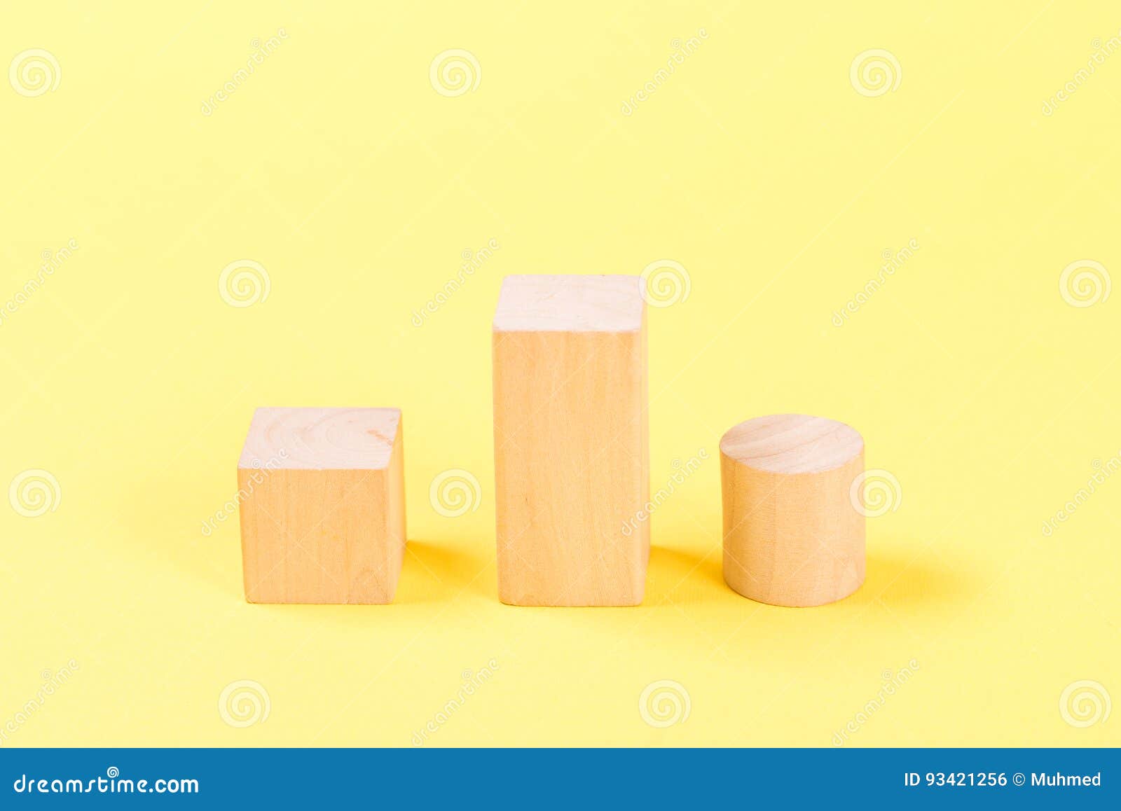 Wooden Building Blocks on Yellow Background. Stock Photo - Image of ...