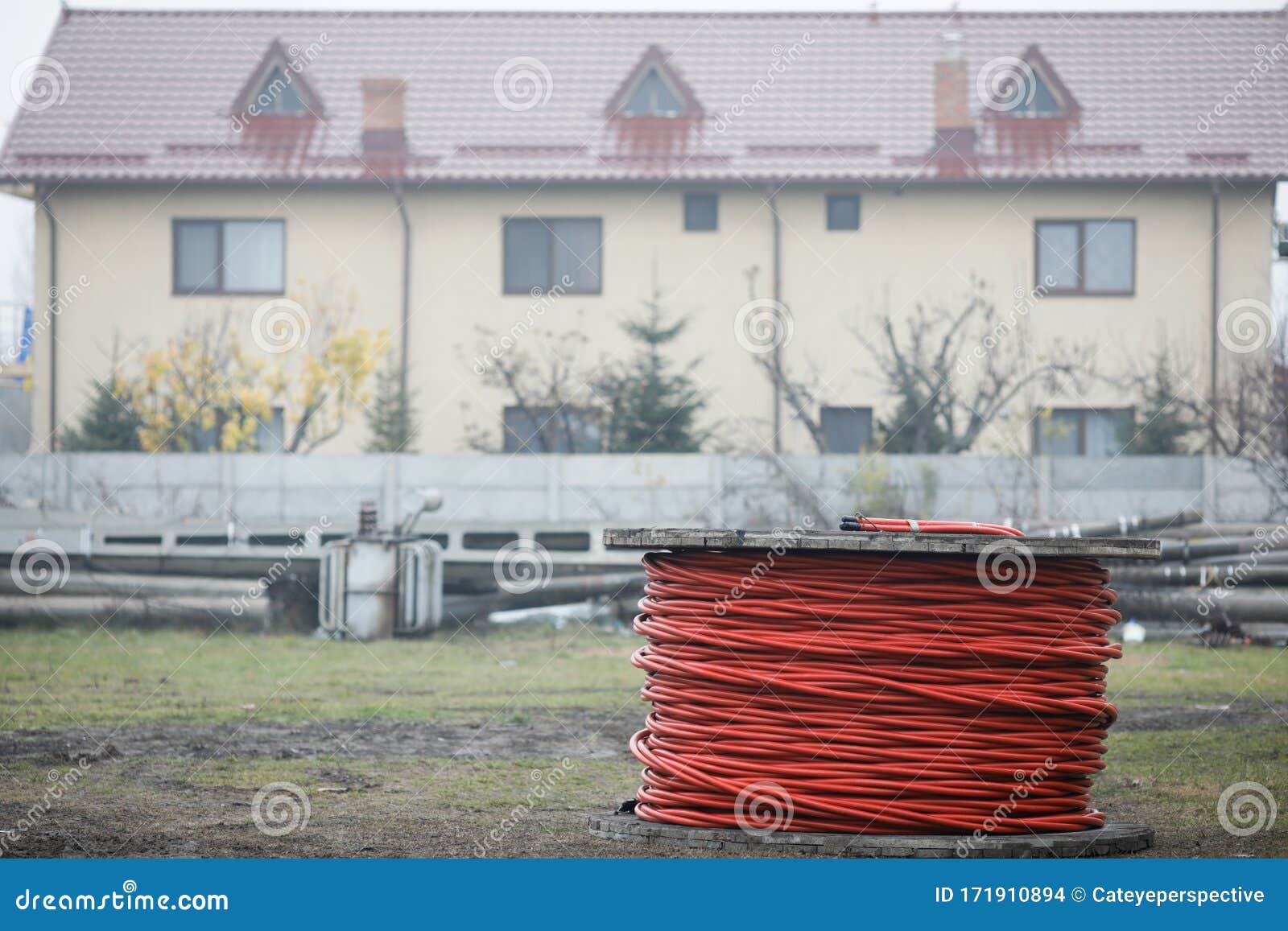 Wooden Cable Reels Outdoors during a Cold Rainy Day Stock Photo - Image ...