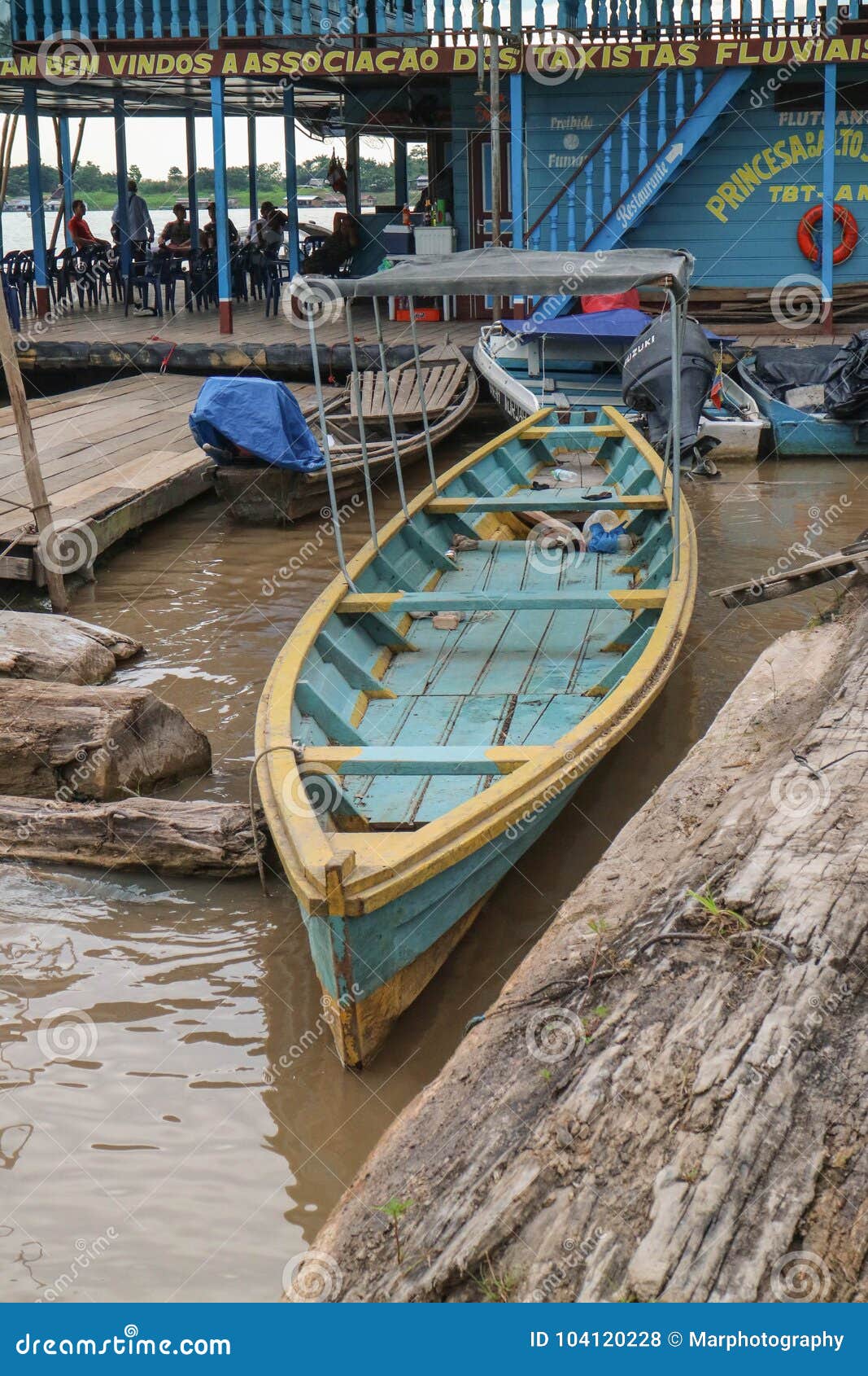 Wooden canoe in river port editorial stock photo. Image of local ...
