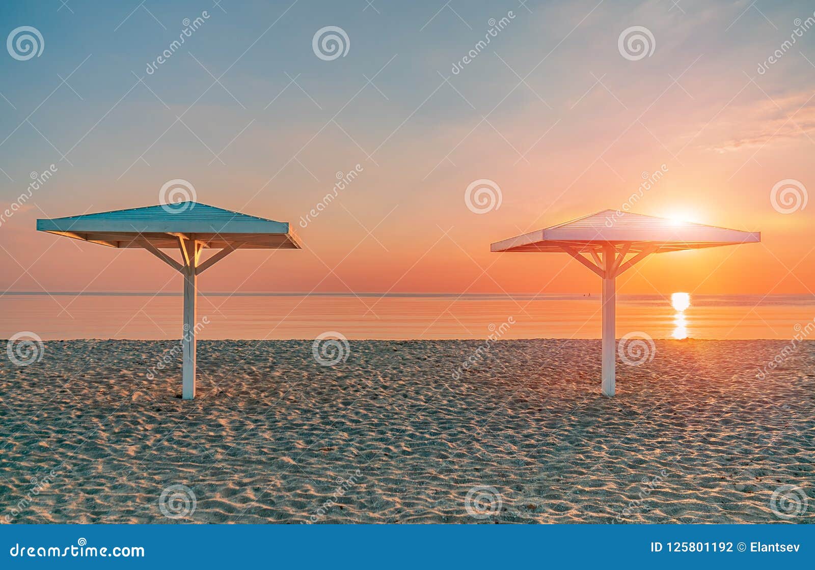 Wooden Canopy on Empty Beach during Sunset Stock Photo - Image of ...