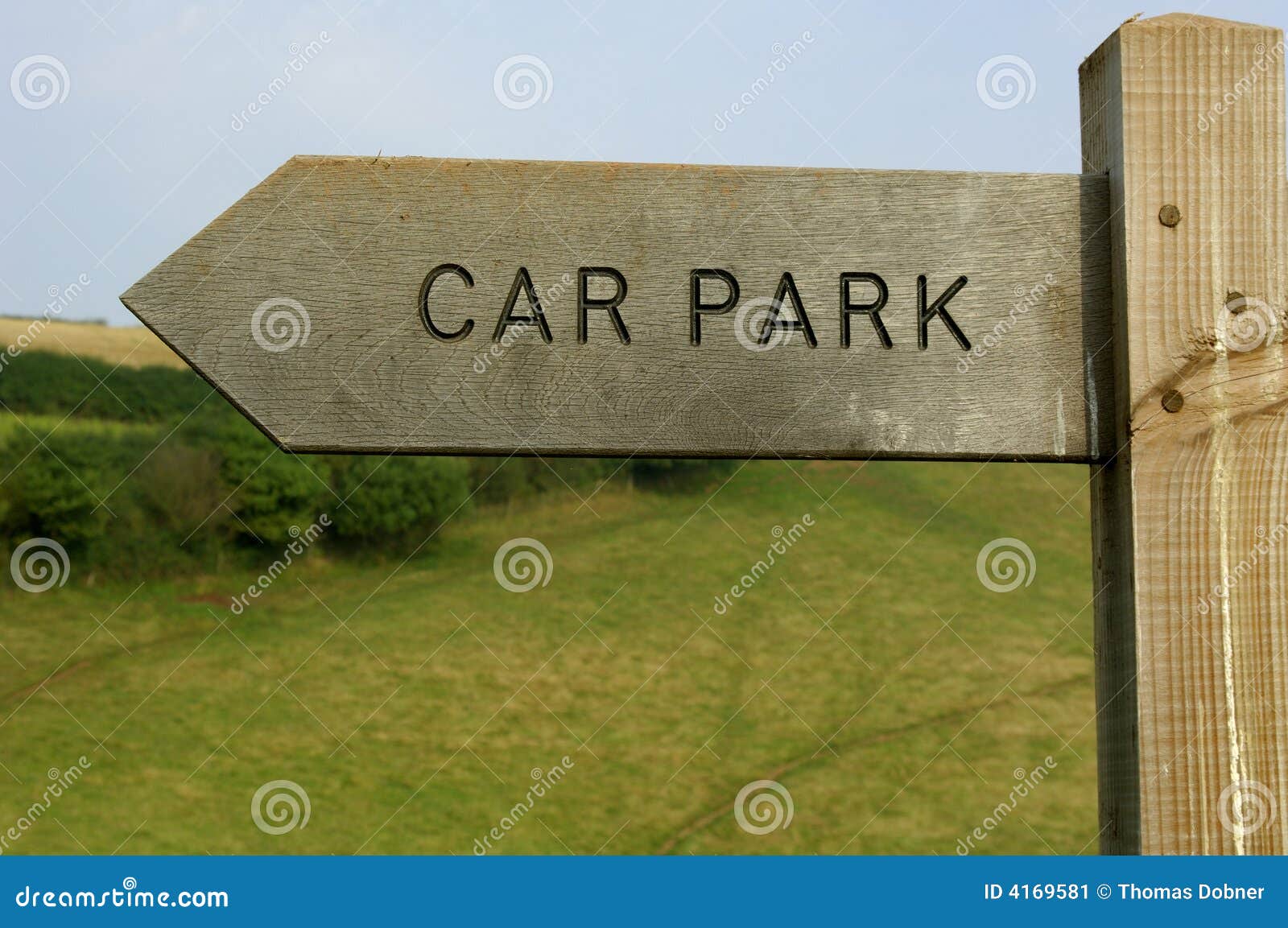 Wooden car park sign stock image. Image of direct, wood - 4169581