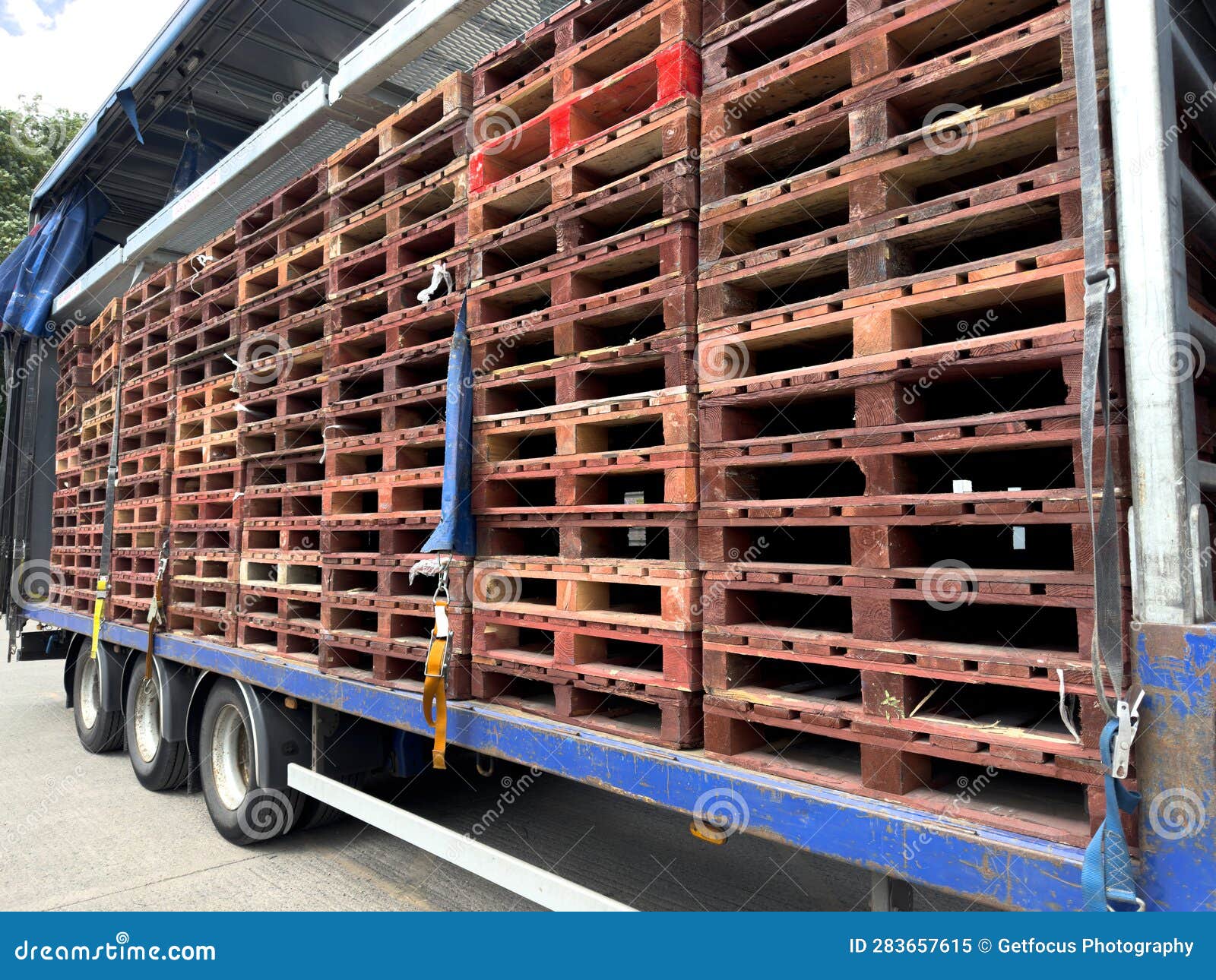 Wooden cargo pallets stock image. Image of delivery - 283657615