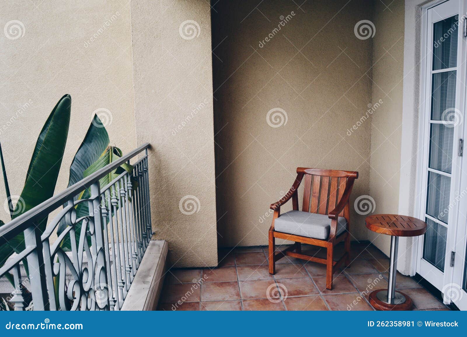 Wooden Chair and Small Table on a Balcony Stock Image - Image of home ...