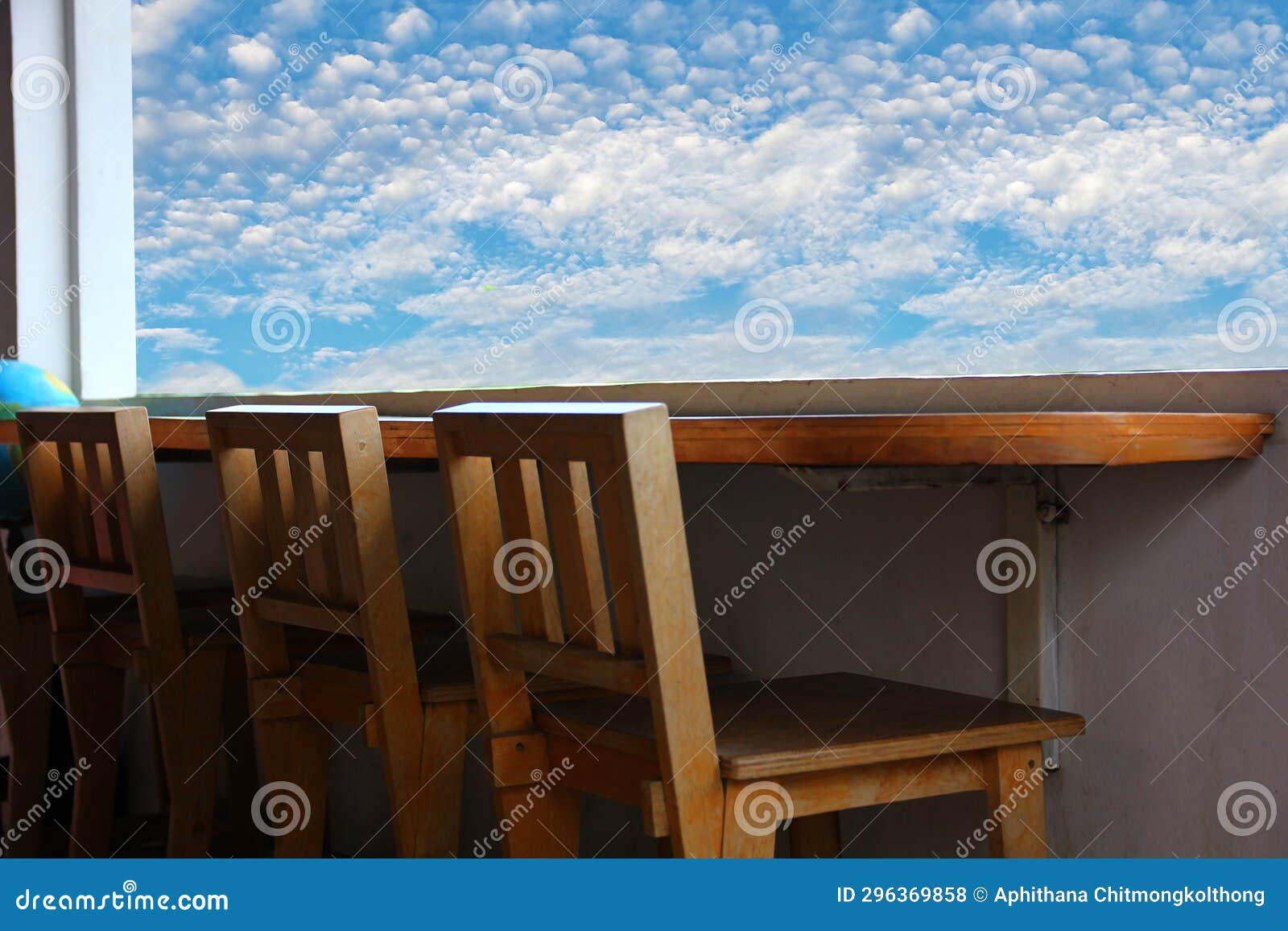 Wooden Chairs and Bar Counter with Blue Sky White Cloud Stock Photo ...