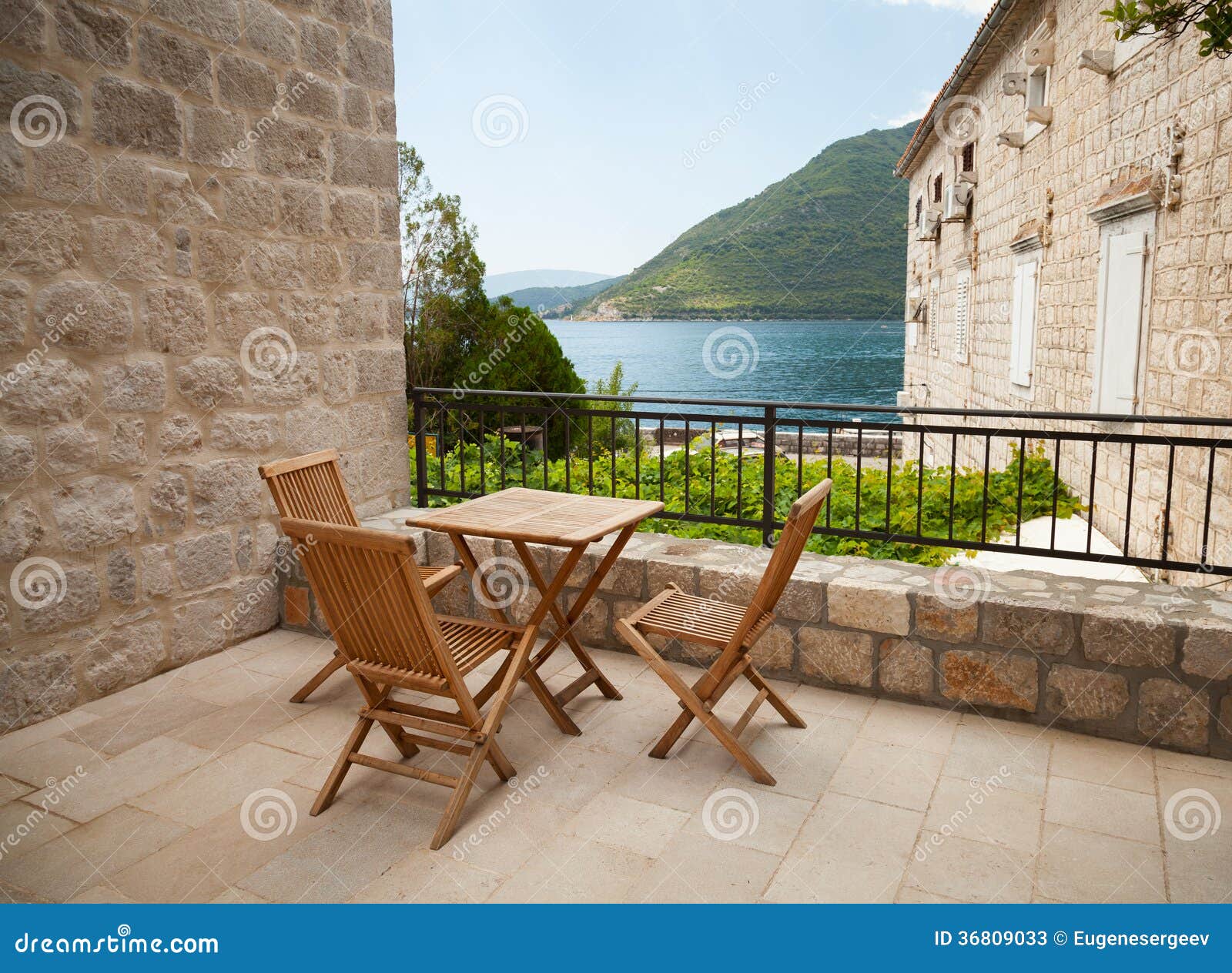 Wooden Chairs and Table on Seaside Terrace Stock Image - Image of ...