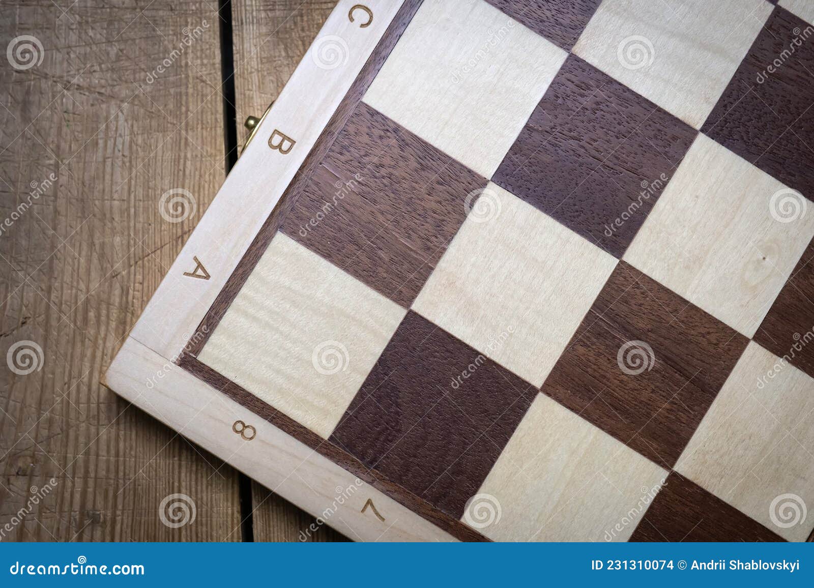 Wooden Chess Board on a Wooden Table. Board Game, Top View Stock Photo ...