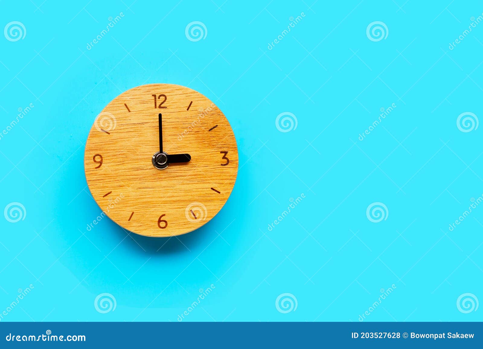 Wooden Clock on Blue Background Stock Photo - Image of creative ...