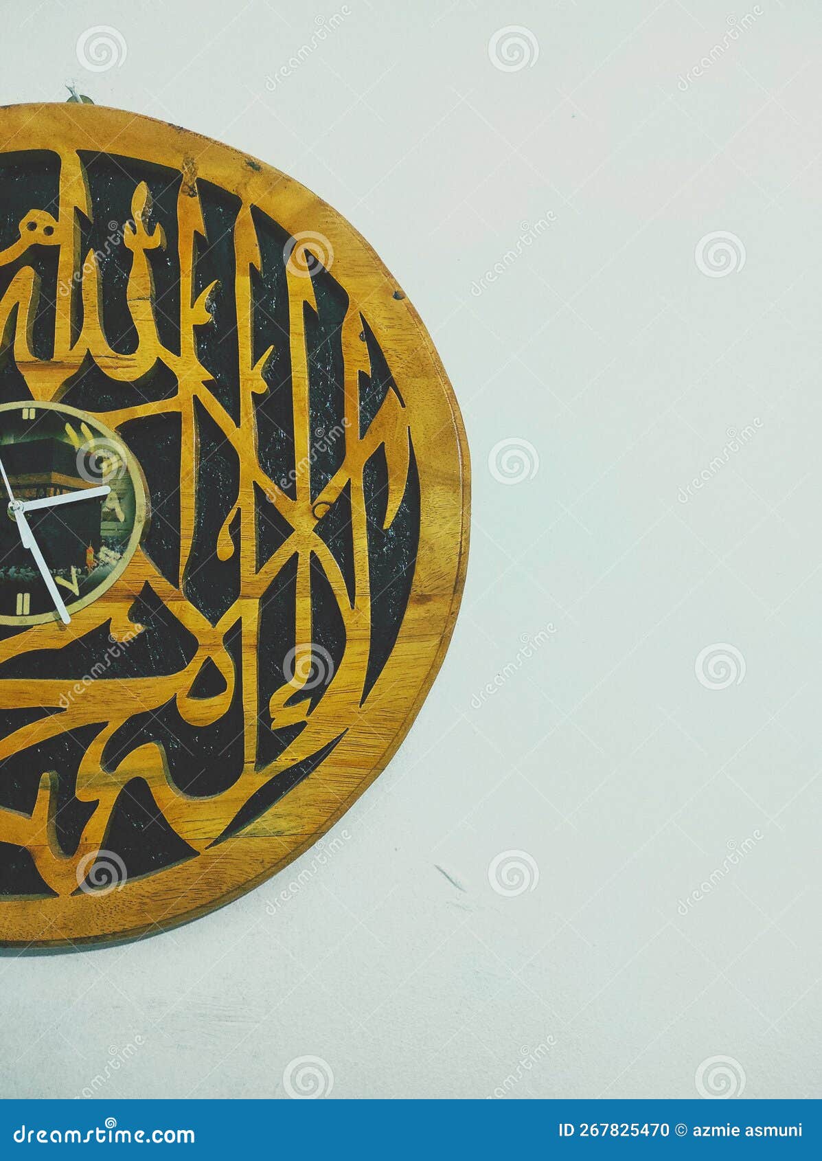 Wooden Clock on the Wall with Writing in Arabic and Beautiful ...