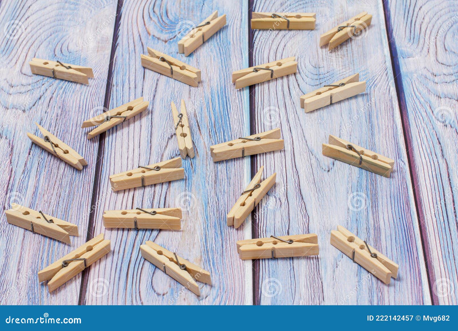 Wooden Clothes Pins on a Wooden Background Stock Image - Image of ...