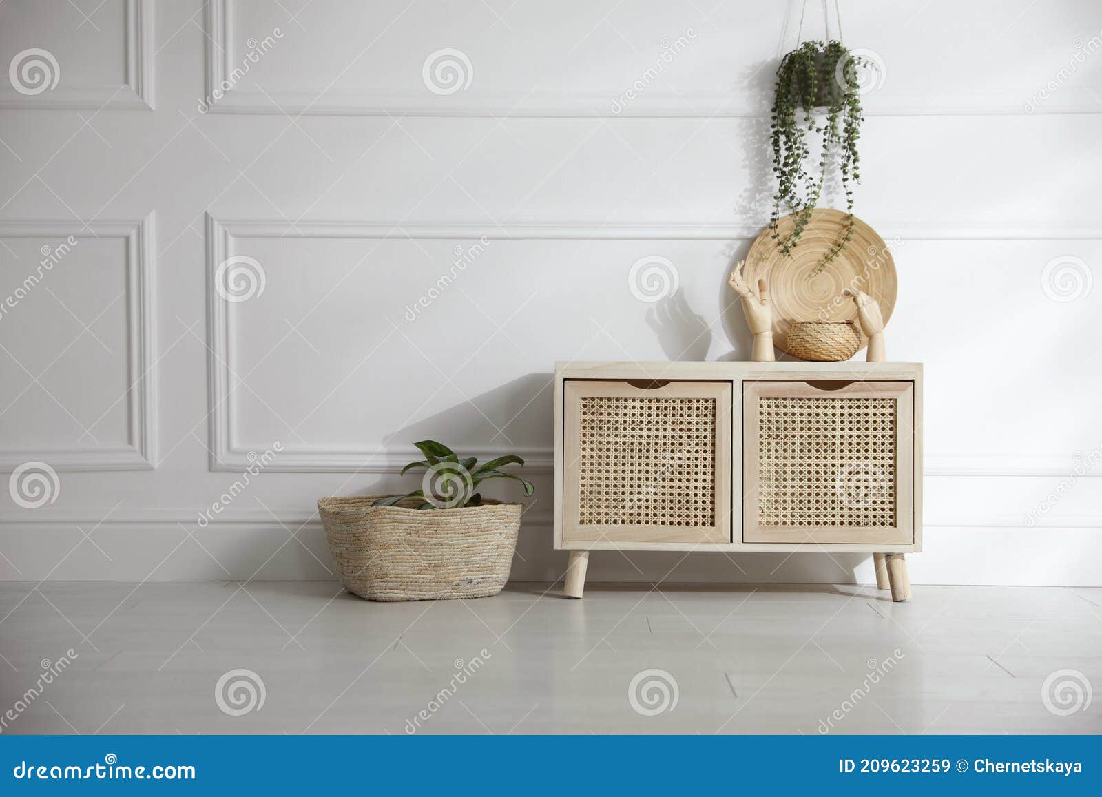 Wooden Commode Near White Wall in Room. Interior Design Stock Image ...