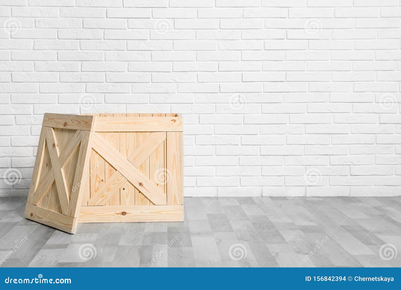 Wooden Crate on Floor at White Brick Wall Stock Photo - Image of decor ...