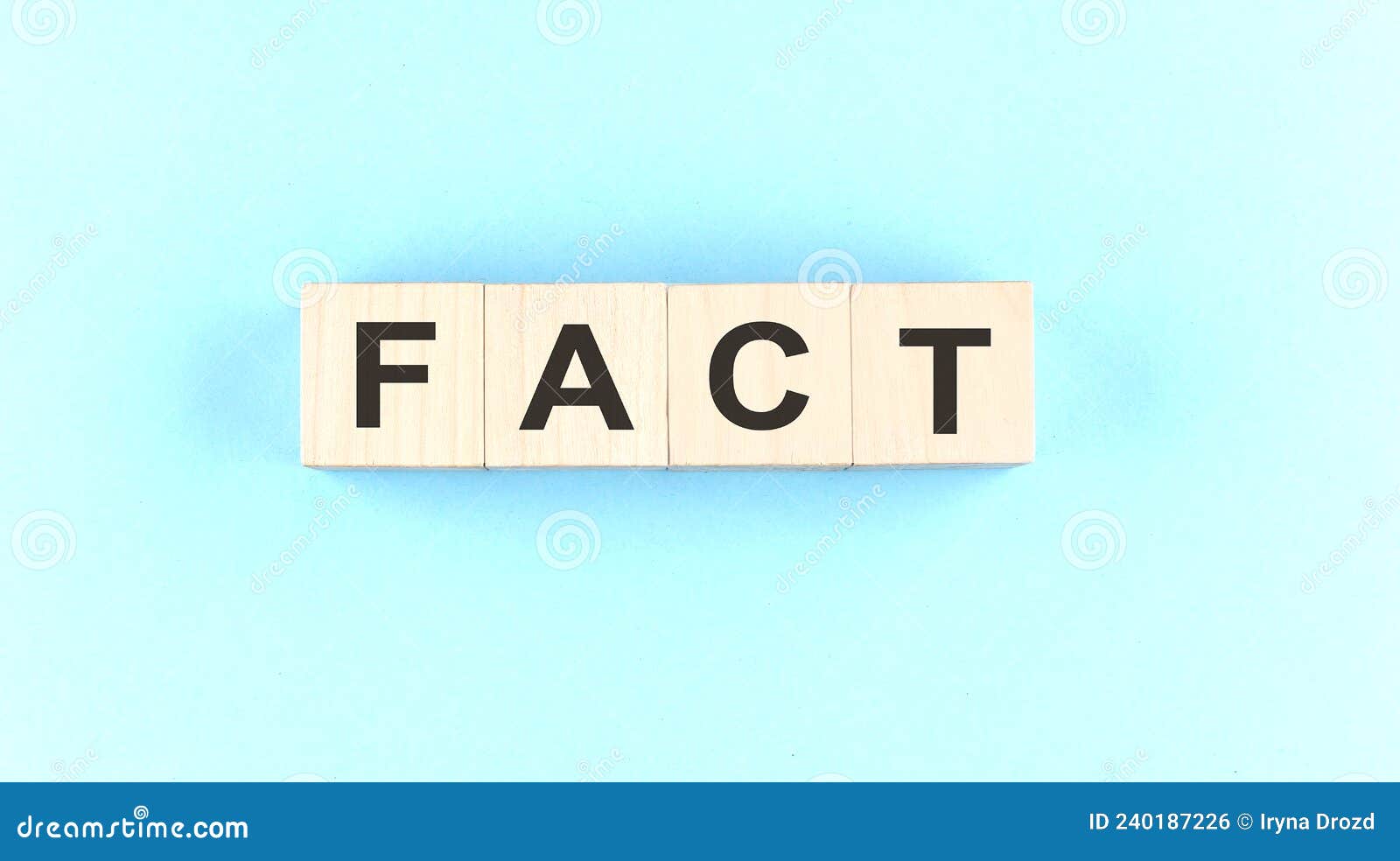 Wooden Cube Block with Text FACT on the Blue Background Stock Photo ...