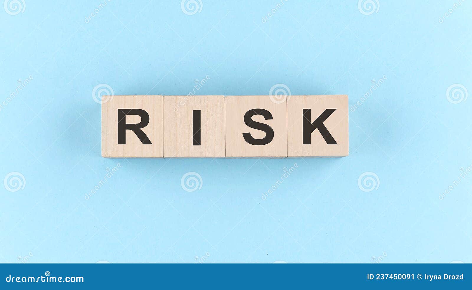 Wooden Cube Block with Text RISK on the Blue Background Stock Image ...