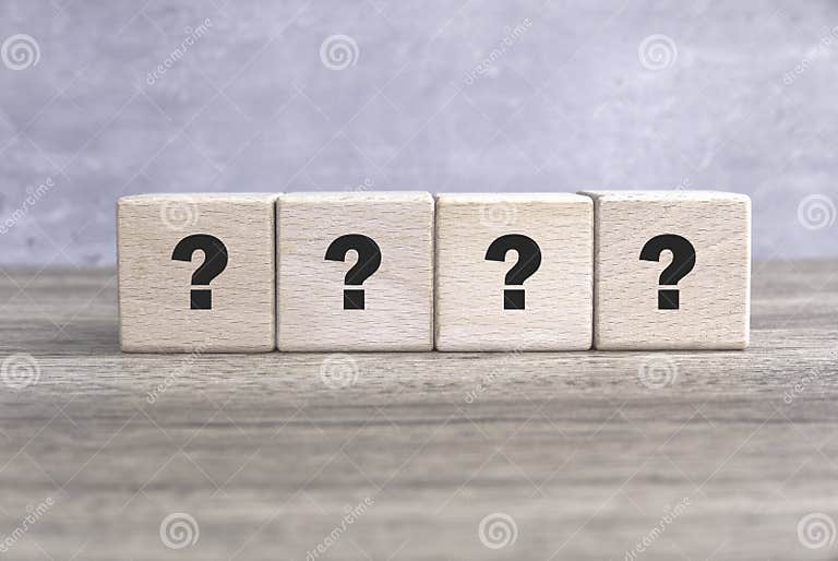 Wooden Cube with Question Mark Symbol on Wooden Table Stock Image ...
