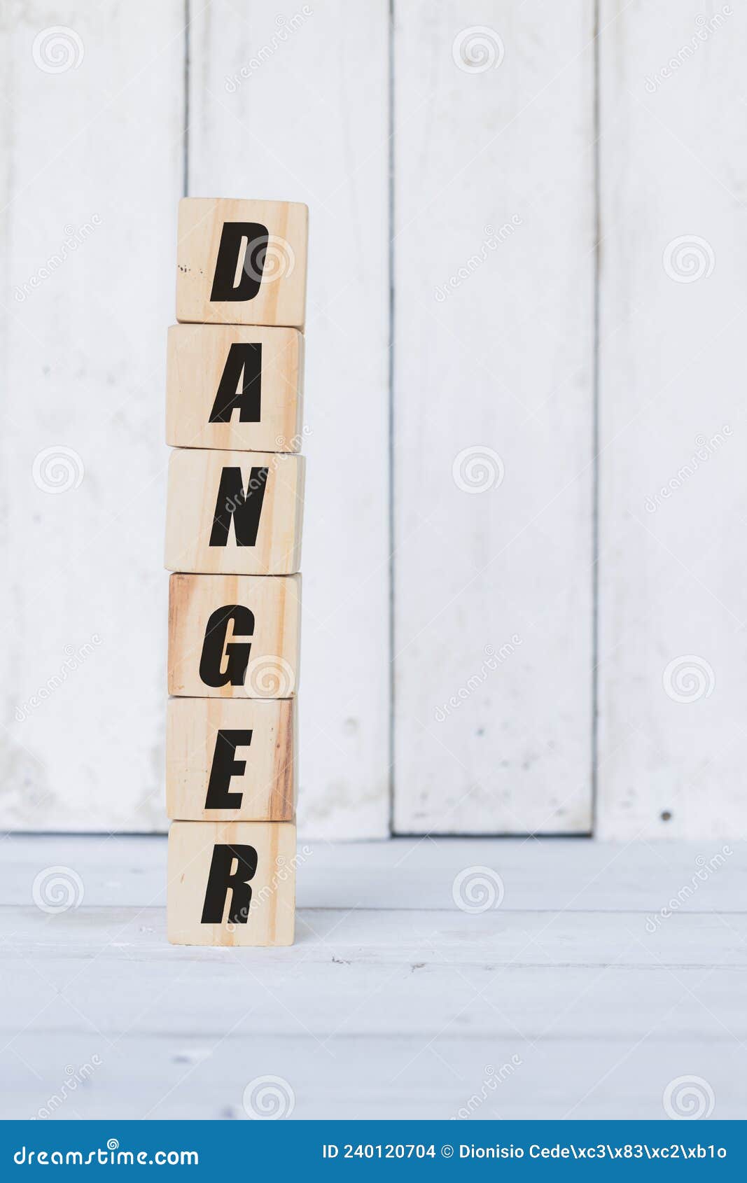 Wooden Cube, with the Word Danger, with White Wooden Background Stock ...