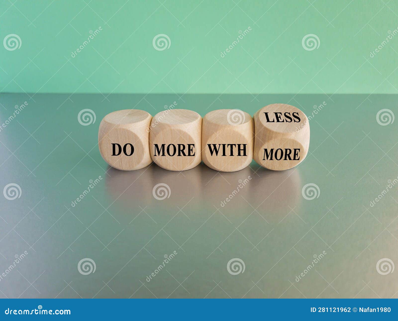 Wooden Cubes Form the Expression Do More with less . Stock Photo ...