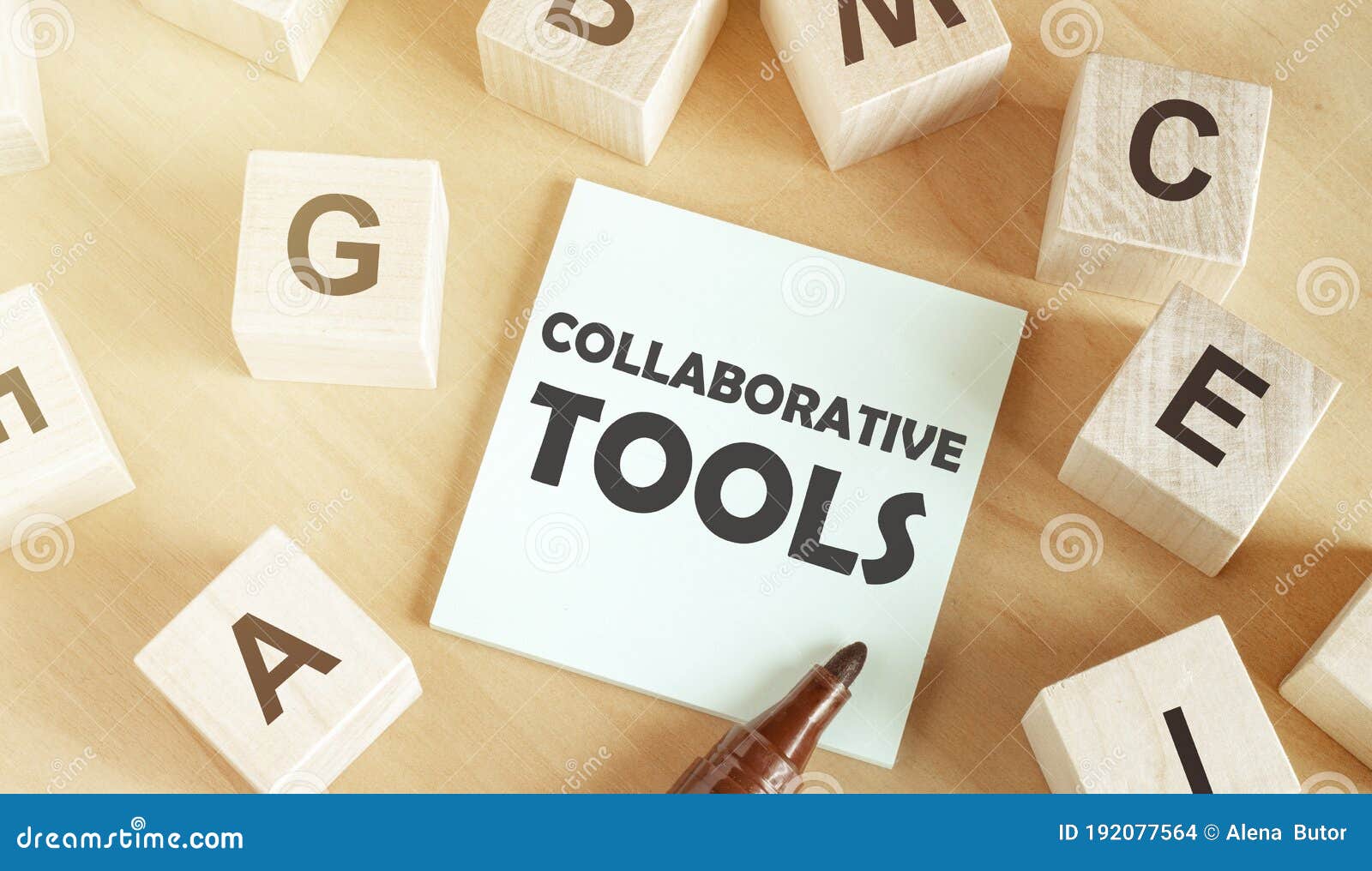 Wooden Cubes with Letters of the Alphabet, a Piece of Paper with the ...