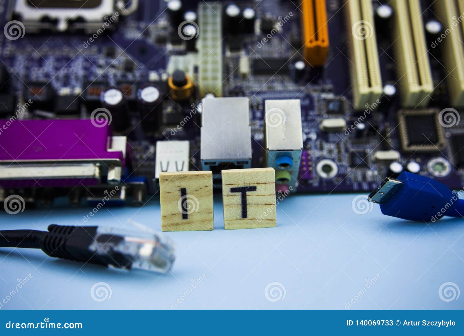 Wooden Cubes with Letters it and Technology Computer Based Background ...
