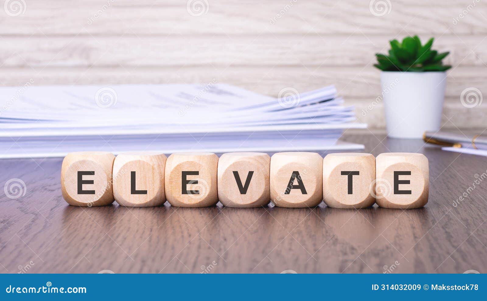 Wooden Cubes with Text ELEVATE on Brown Background Stock Image - Image ...