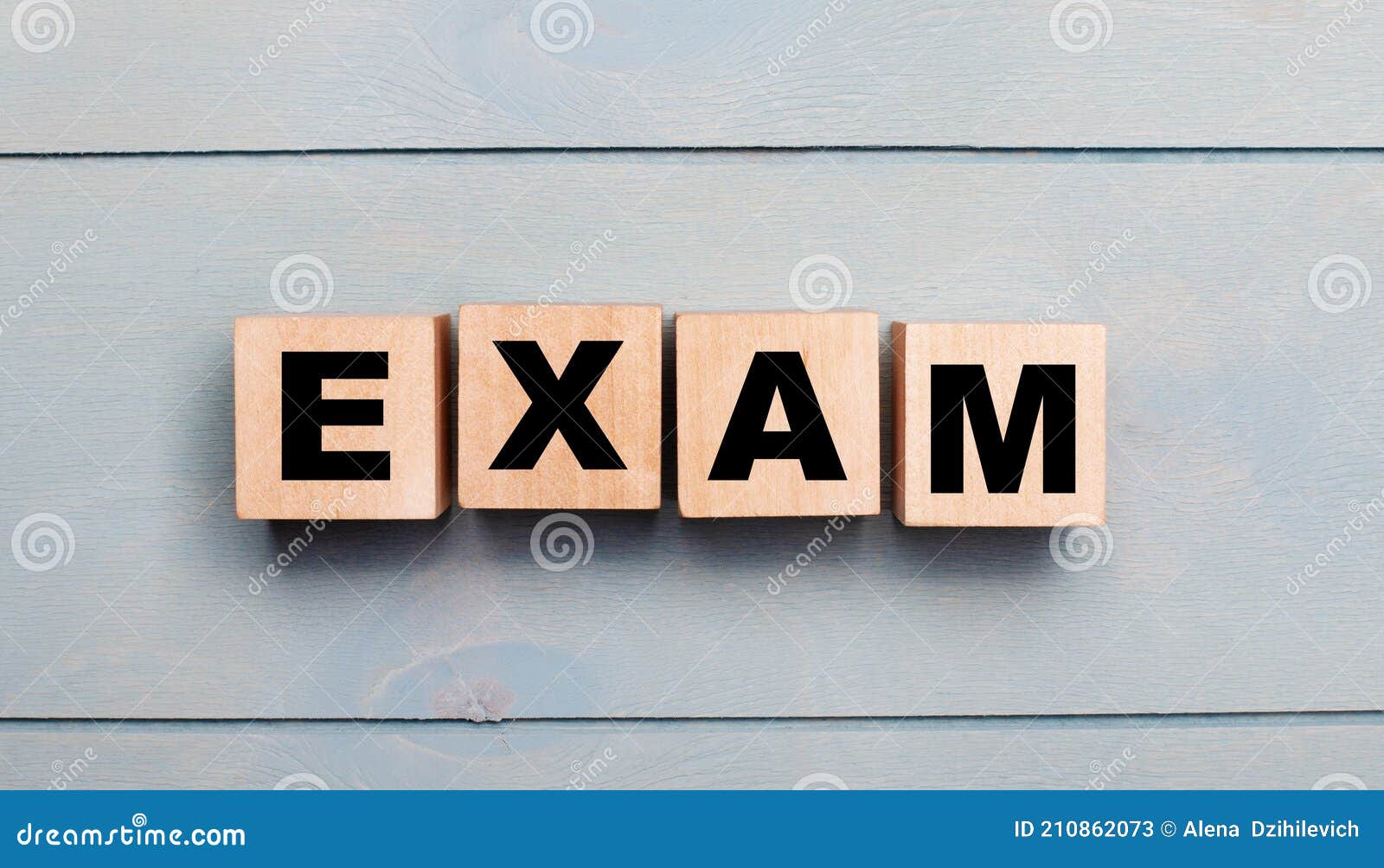 Wooden Cubes with the Text EXAM on a Light Blue Wooden Background Stock ...