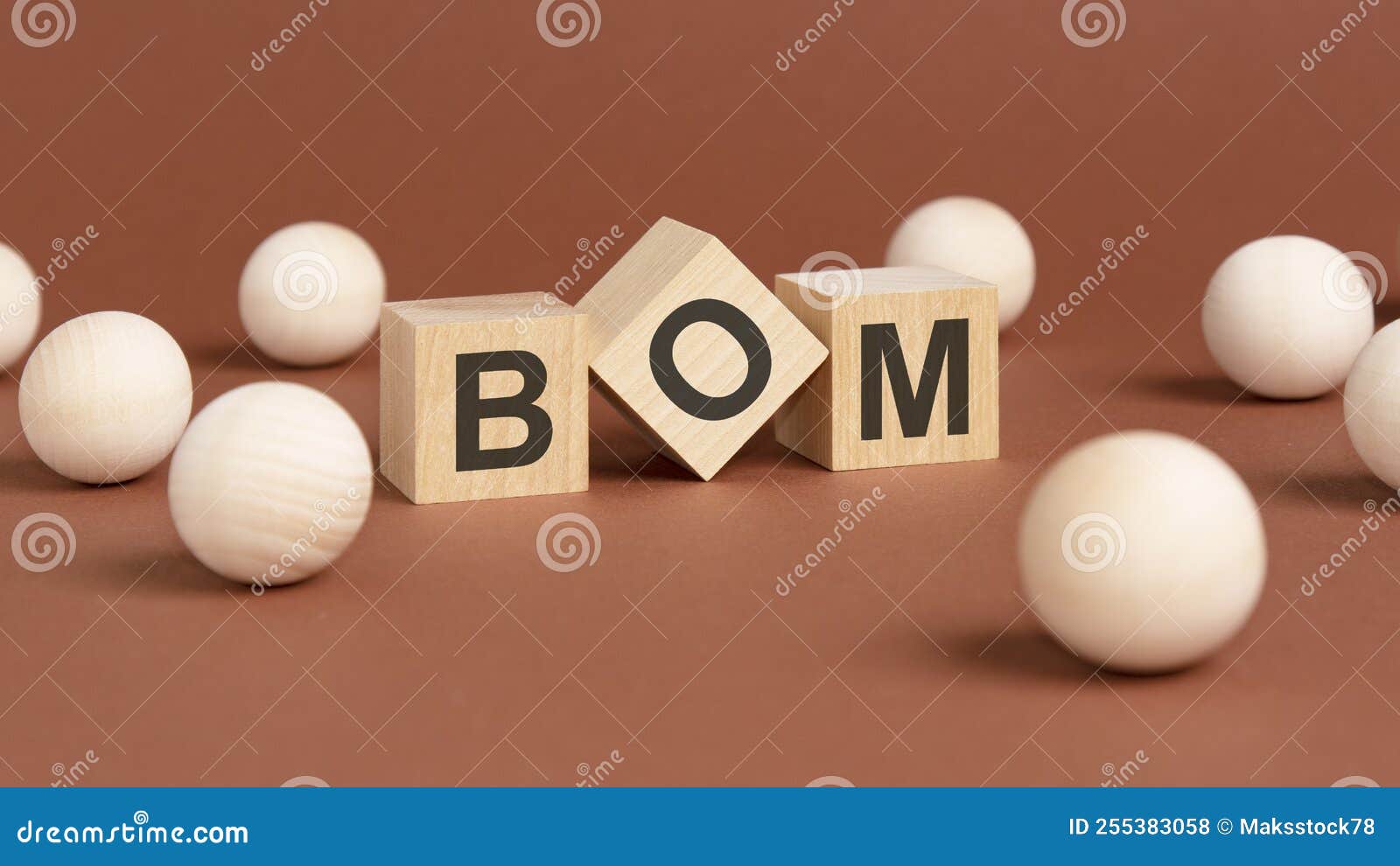 Wooden Cubes with Word BOM on Brown Background. Front View Stock Photo ...