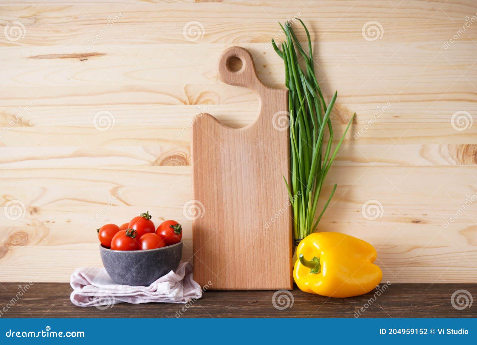 Wooden Cutting Board and Vegetables on Wooden Background Stock Photo ...