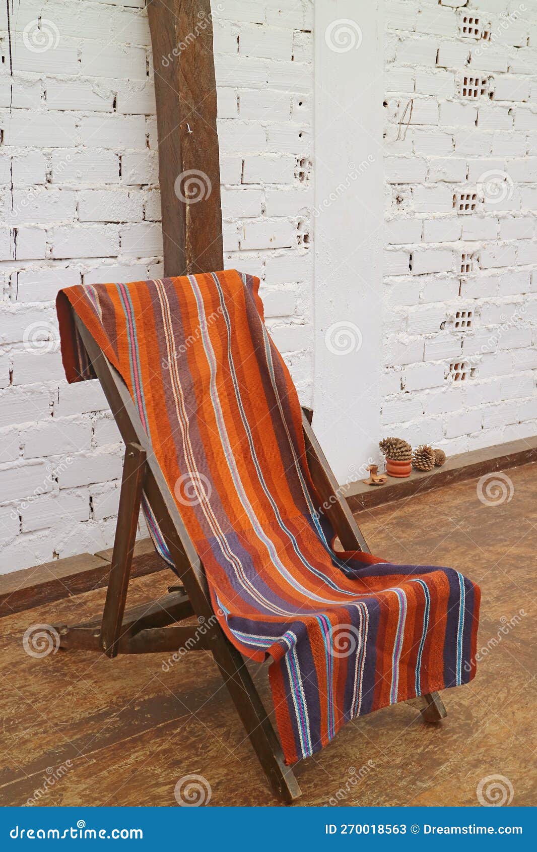 Wooden Deck Chair with Peruvian Fabric at the Balcony Stock Image ...