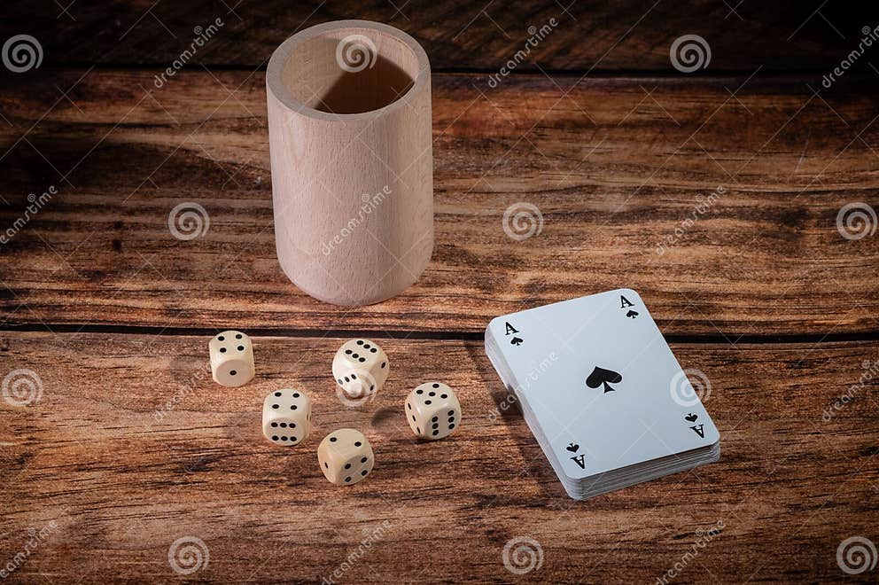 Wooden Dice and Playing Cards on a Rustic Table. Stock Image - Image of ...