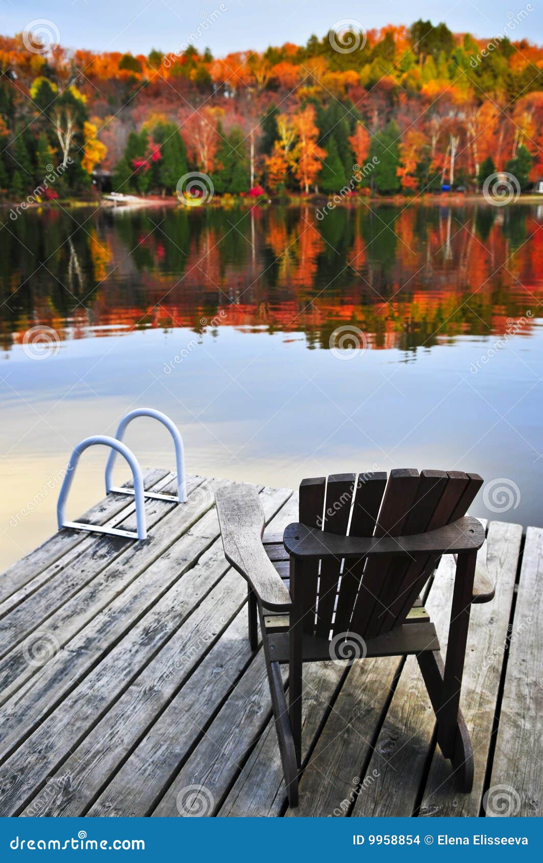 Wooden dock on autumn lake stock photo. Image of dusk - 9958854