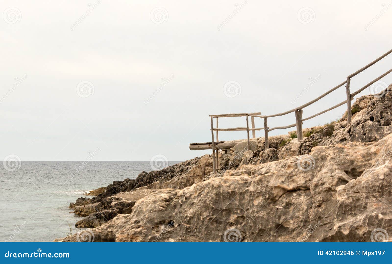 Wooden dock at the cliff stock photo. Image of banister - 42102946