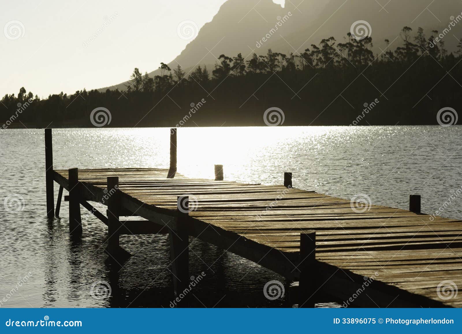 Wooden Dock in Lake at Sunset Stock Image - Image of south, outdoors ...
