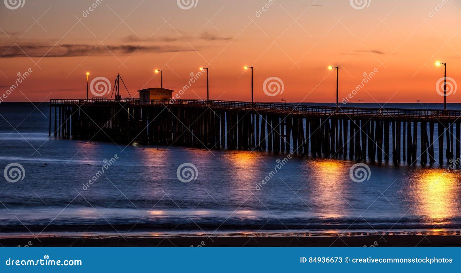 Wooden Dock On Sea Shore With Light Post During Sunset Picture. Image ...